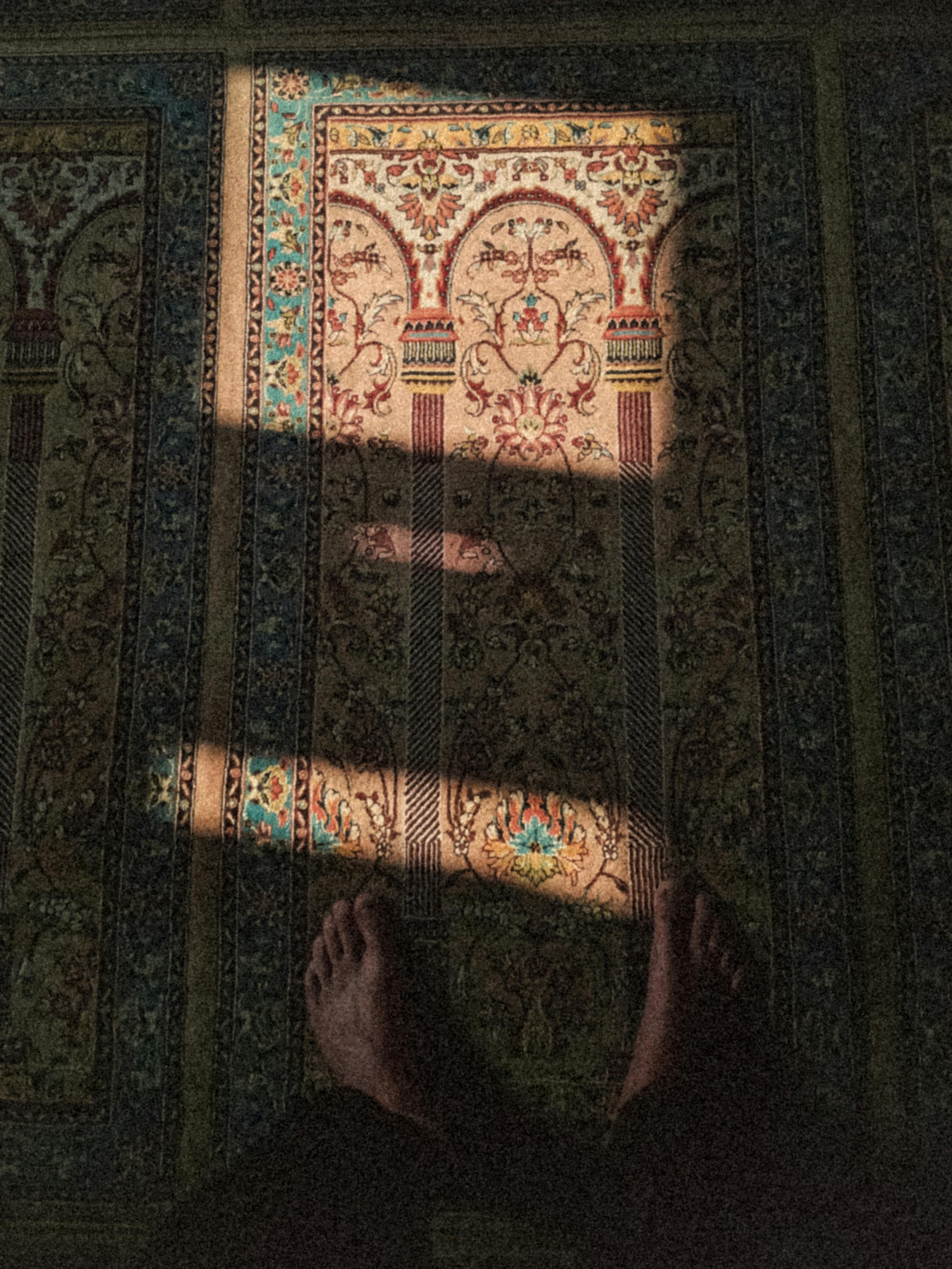 Intricate Persian Carpet with Shadow Play · Free Stock Photo