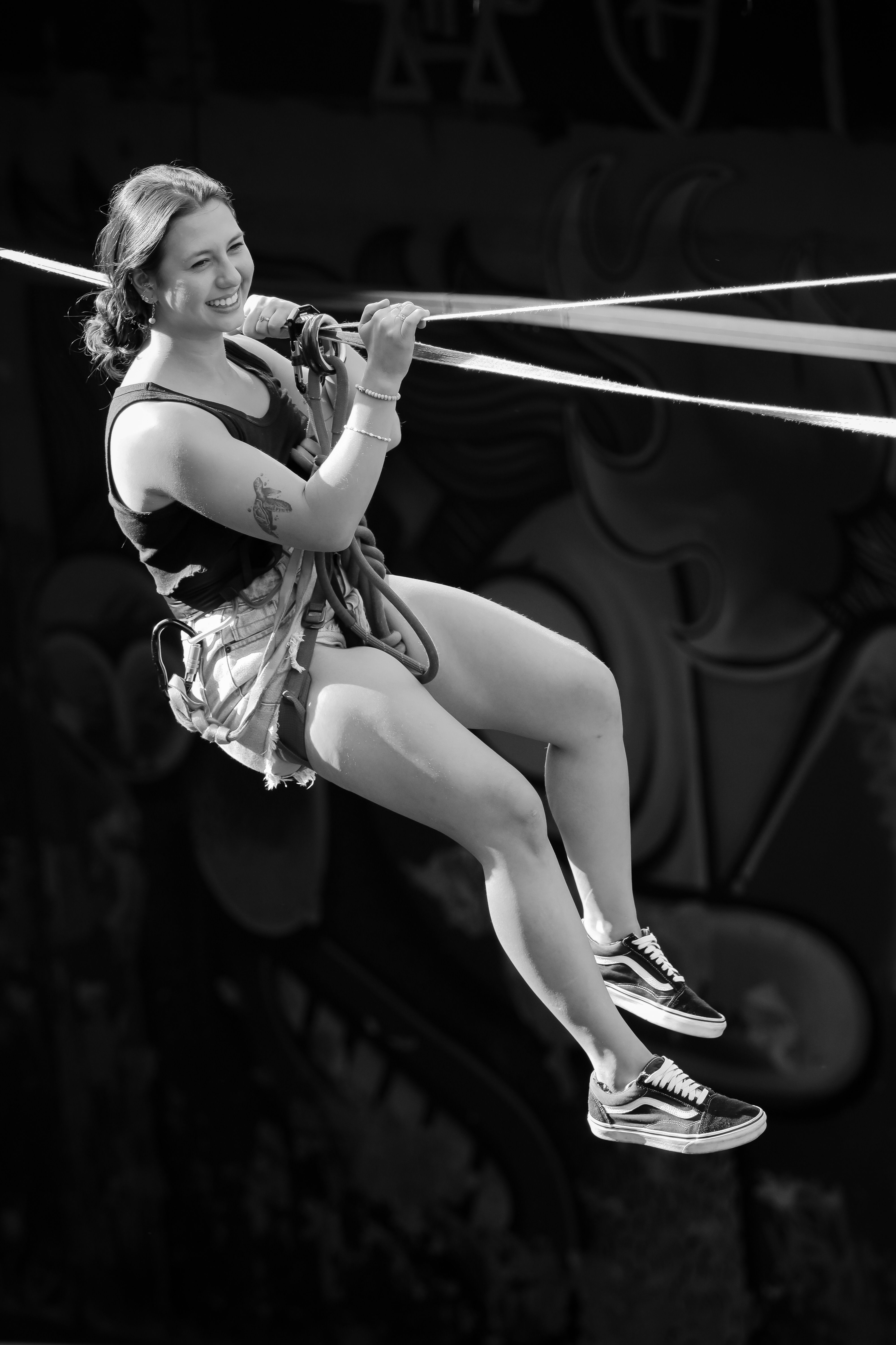Young Woman Ziplining in Urban Setting · Free Stock Photo