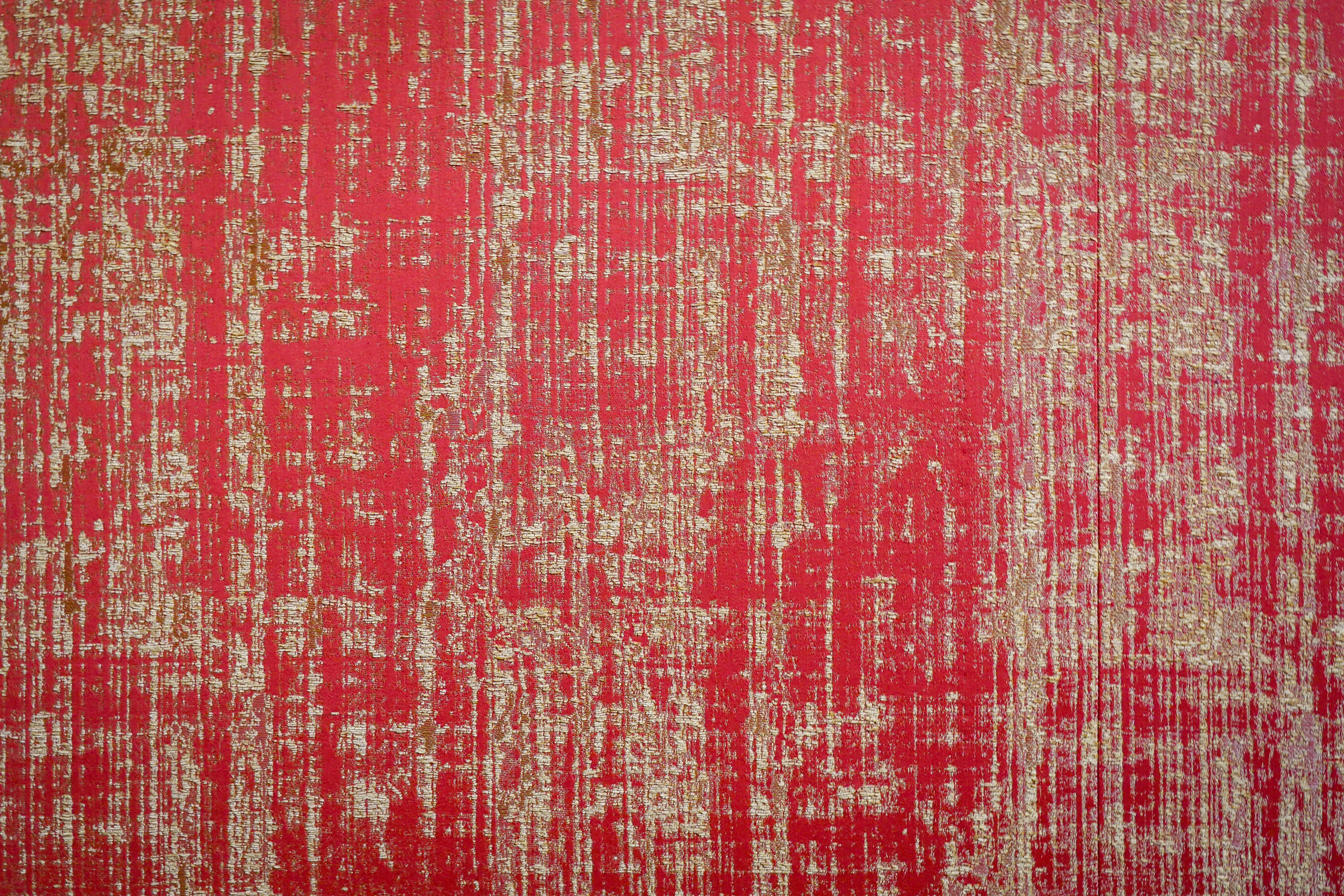 Textured Red Fabric with Rustic Pattern · Free Stock Photo