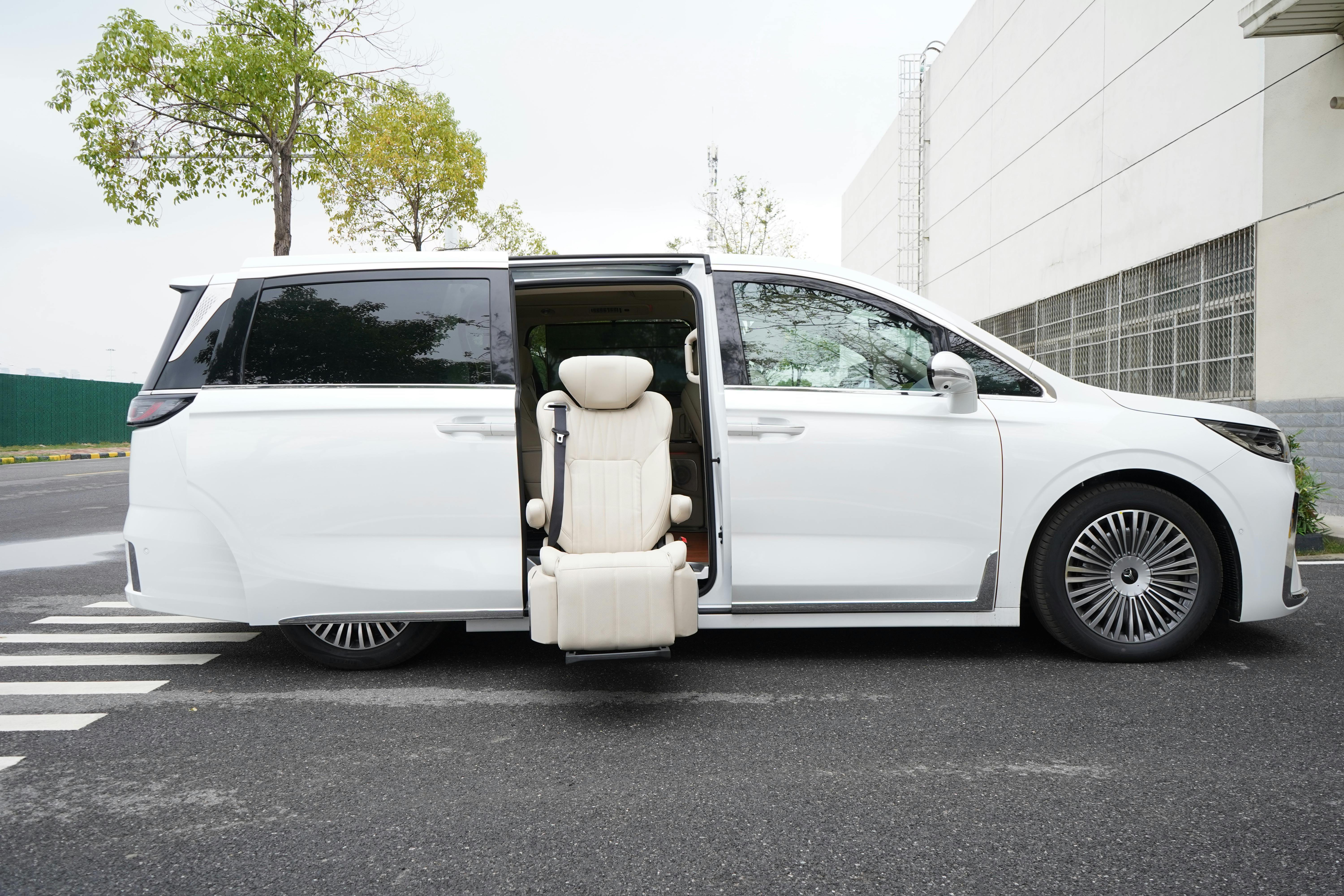 Modern White Minivan with Automatic Sliding Door and Seat · Free Stock ...