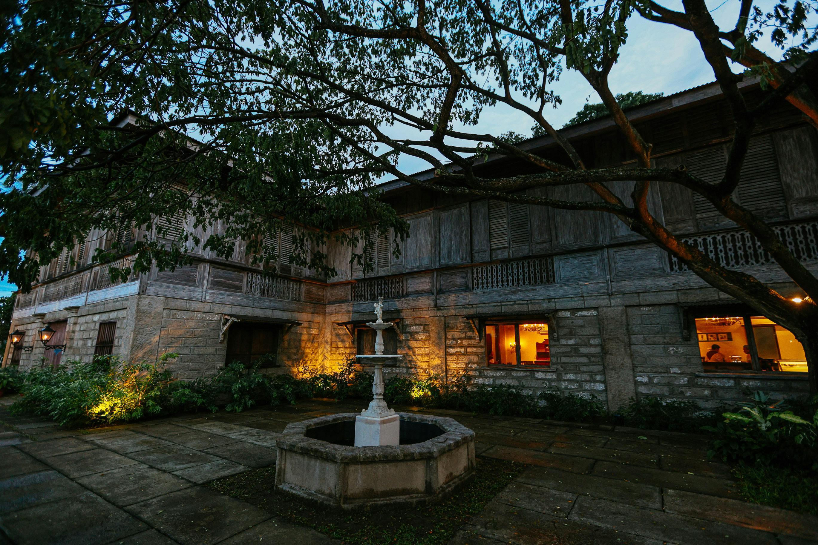 Charming Rustic Stone House in Twilight Setting · Free Stock Photo