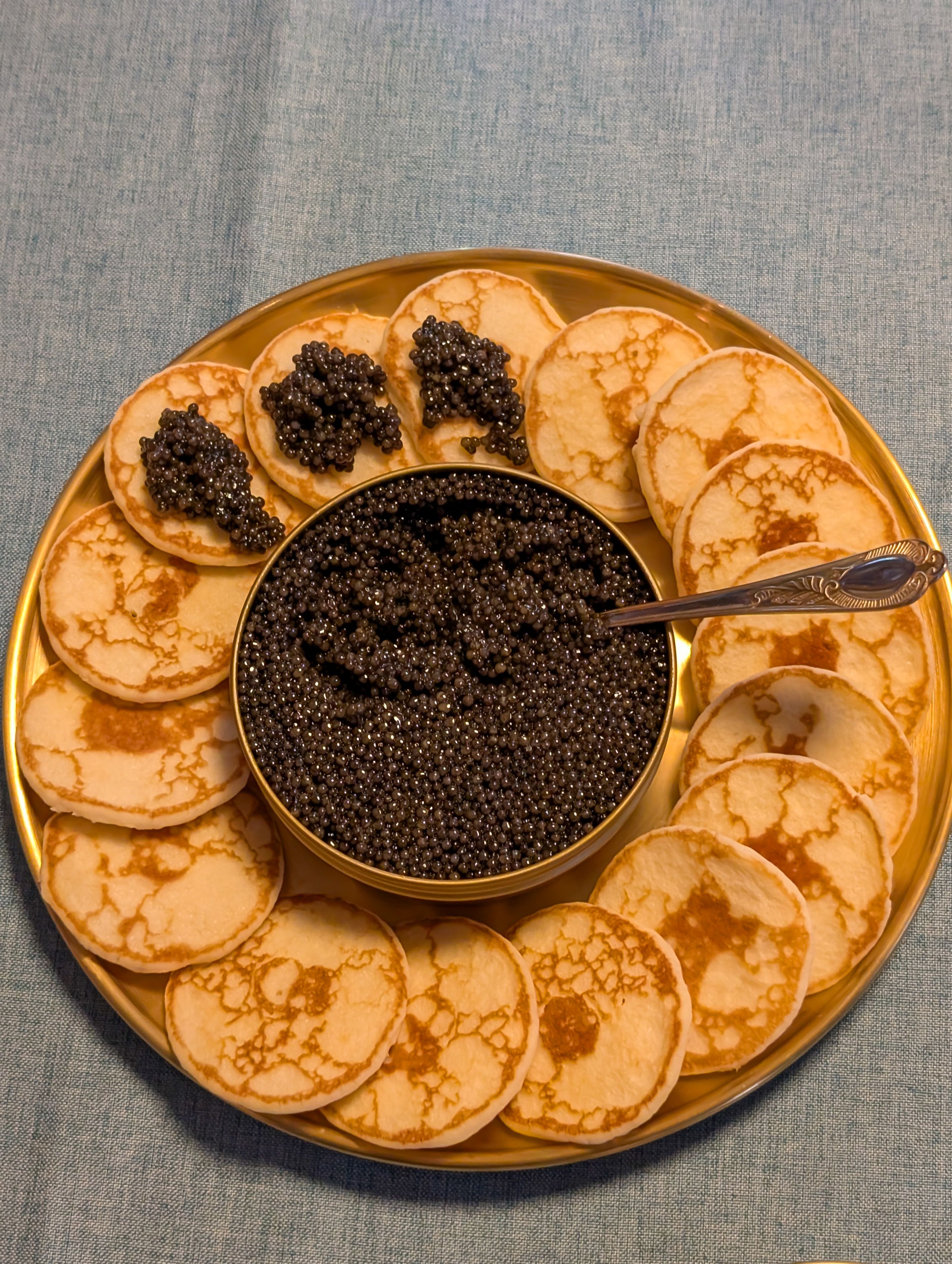 Elegant Caviar Platter with Blinis on Gold Tray · Free Stock Photo