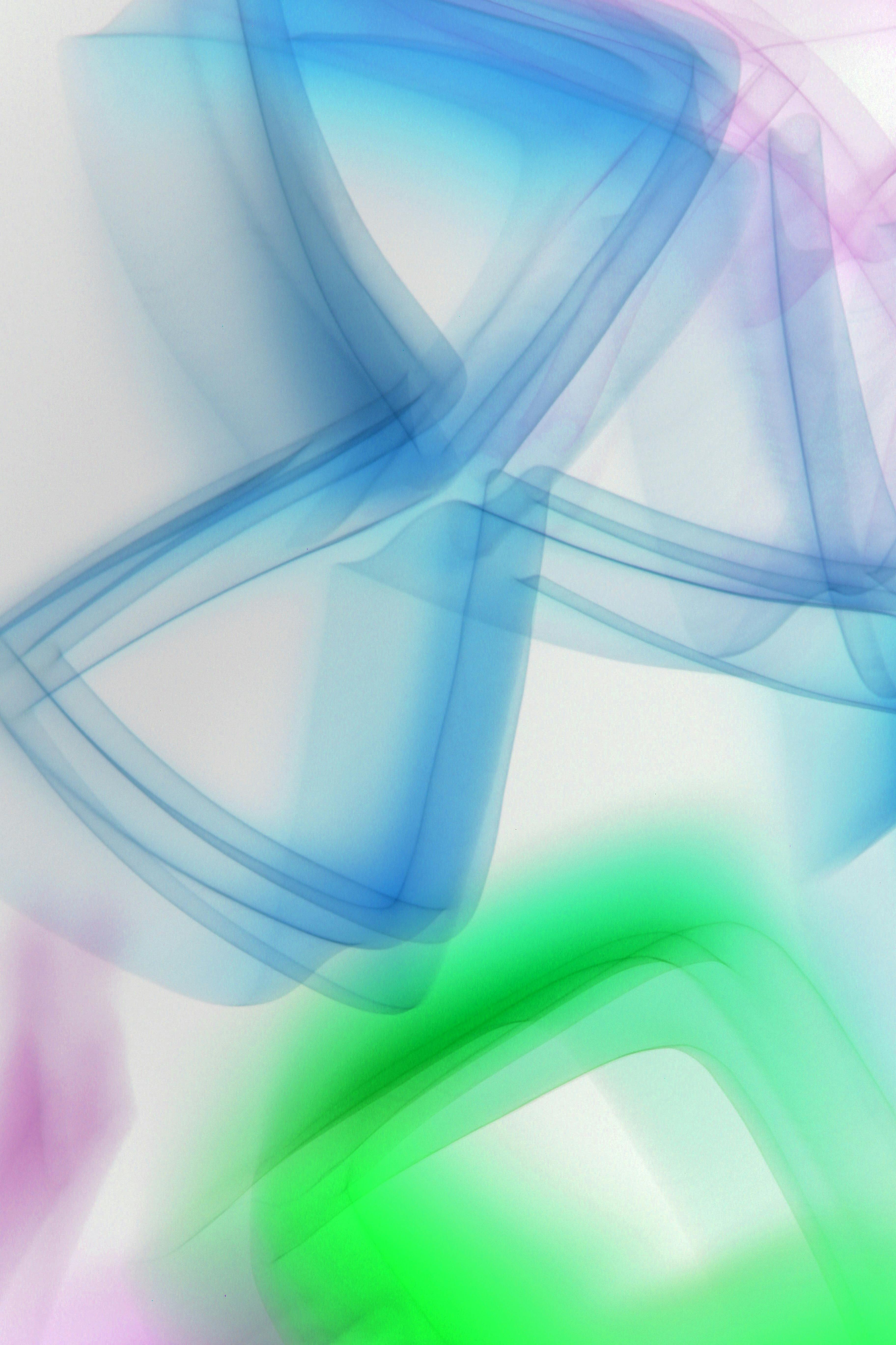 Abstract Colorful Light Patterns on White Background · Free Stock Photo