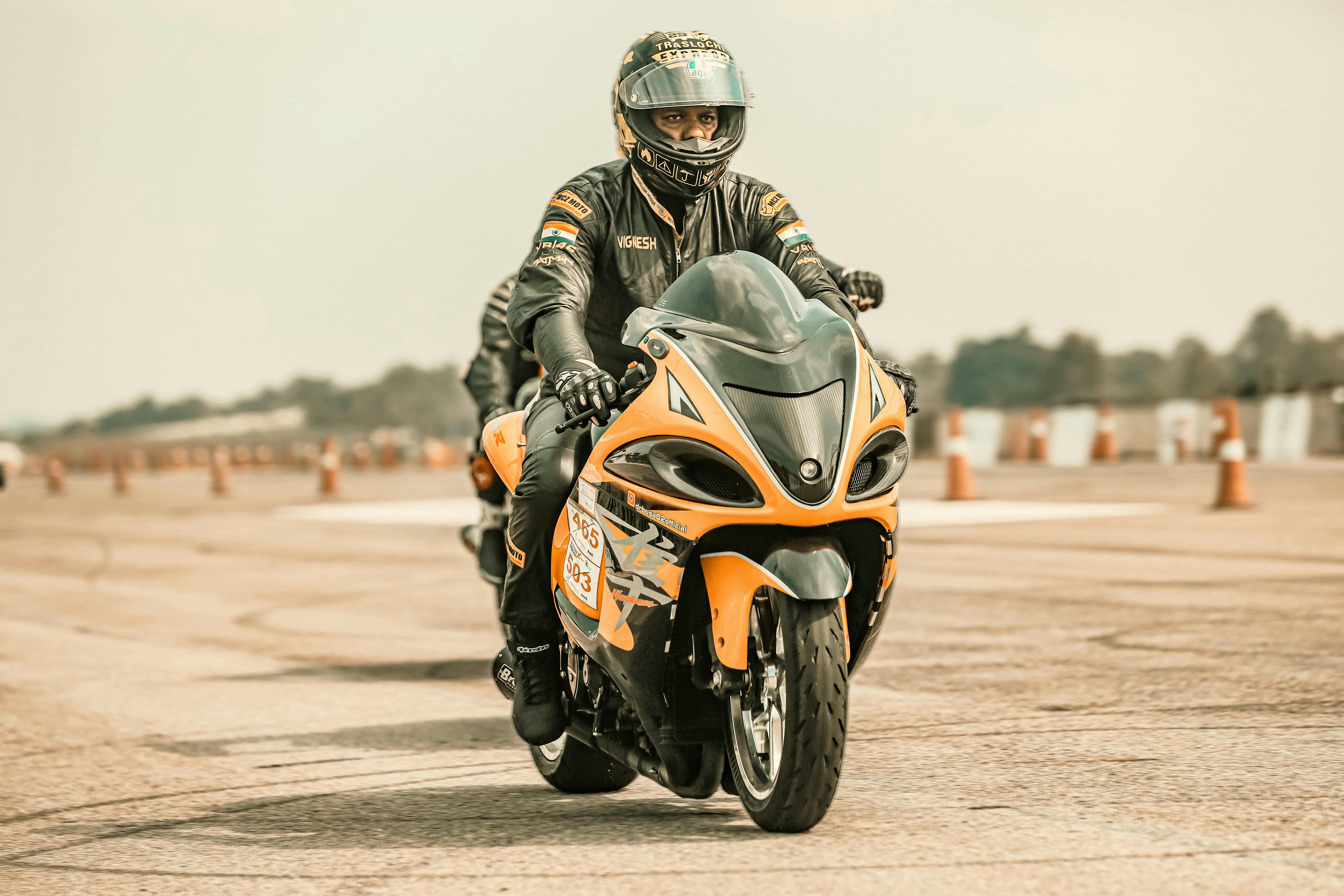 Intense Motorcycle Racing on Open Track · Free Stock Photo