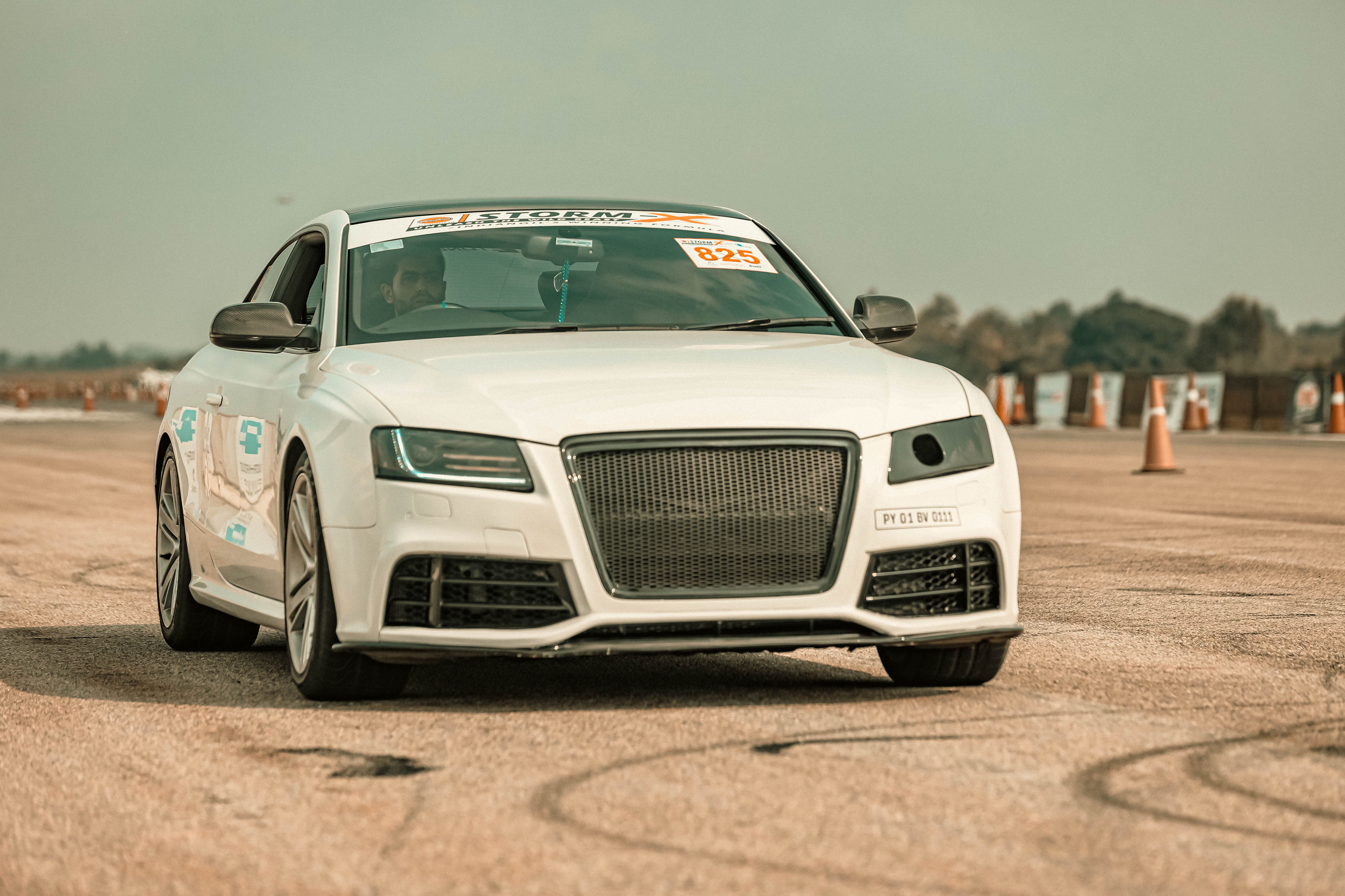 White Racing Car on Outdoor Track · Free Stock Photo
