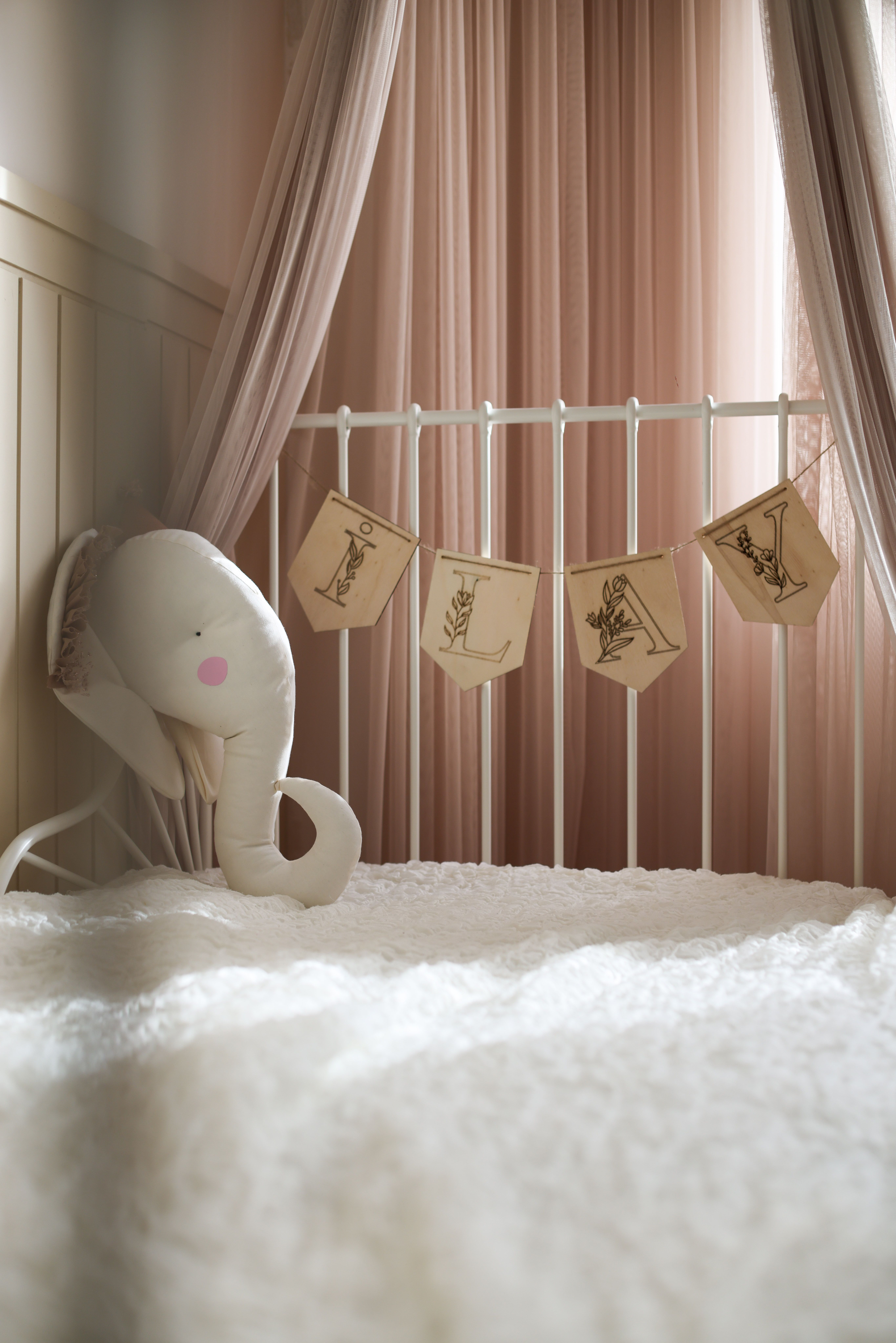 Cozy Baby Nursery with Elephant Toy Decor · Free Stock Photo