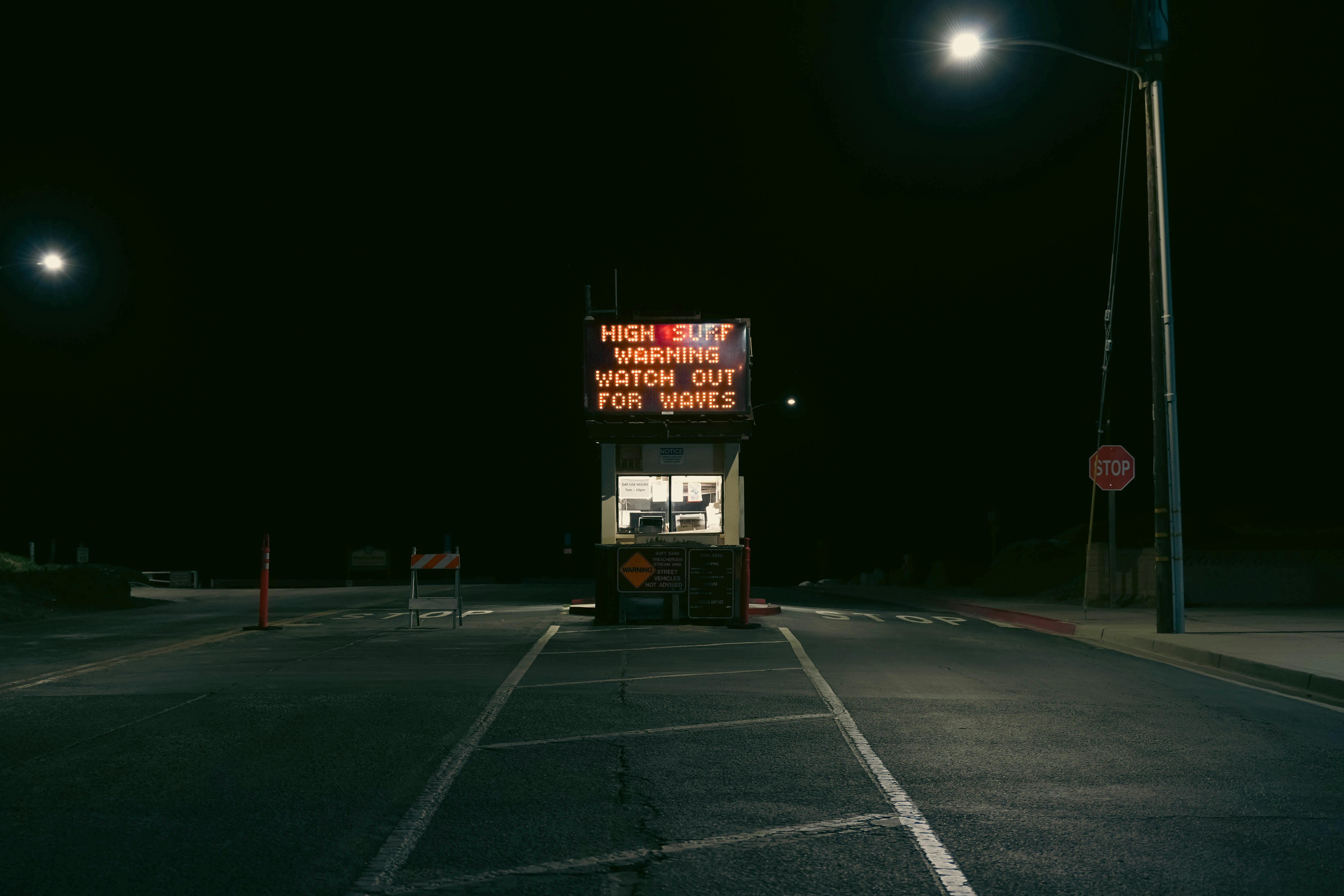 High Surf Warning Sign at Night in Grover Beach · Free Stock Photo
