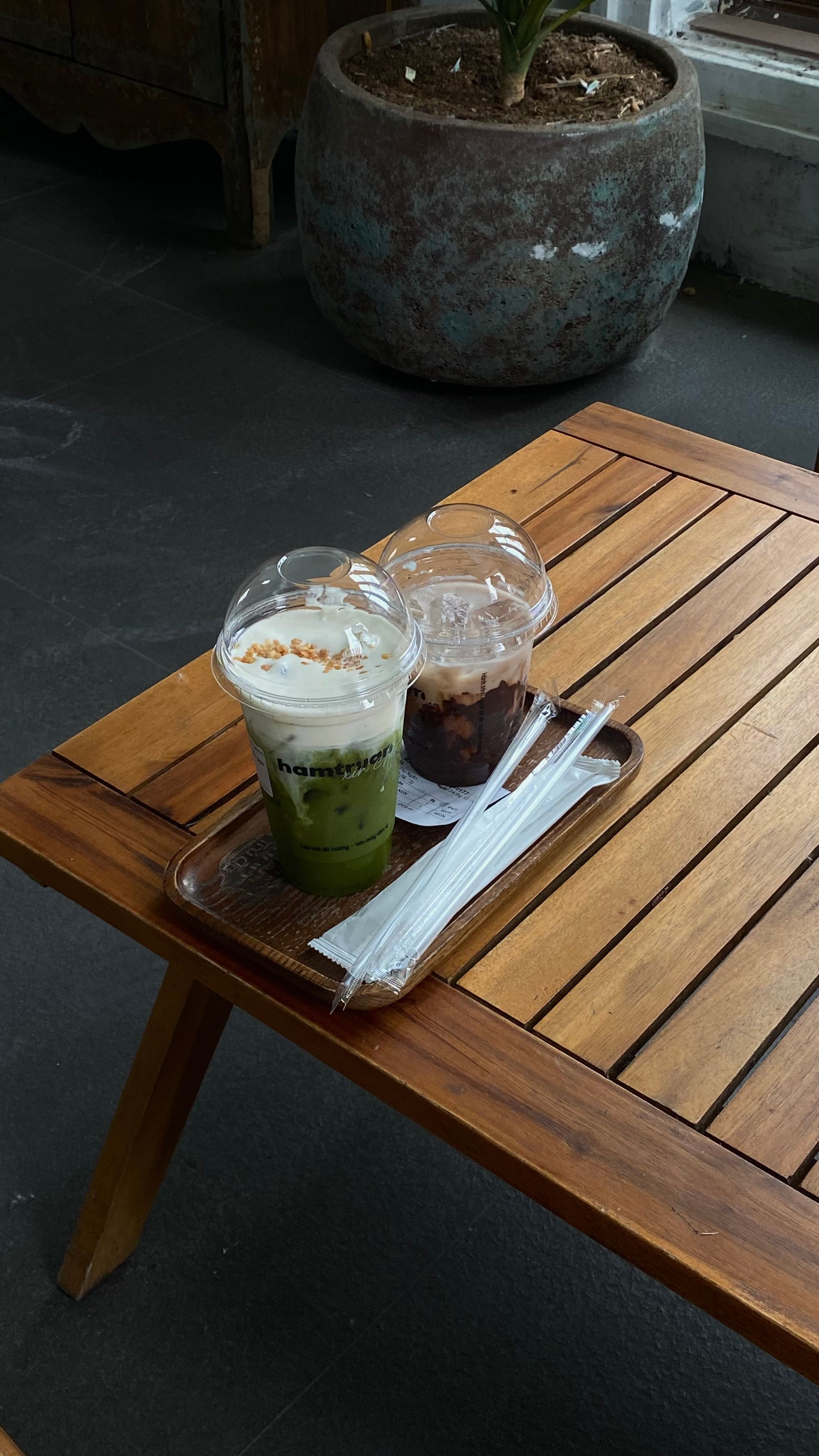 Refreshing Beverages on Wooden Cafe Table · Free Stock Photo