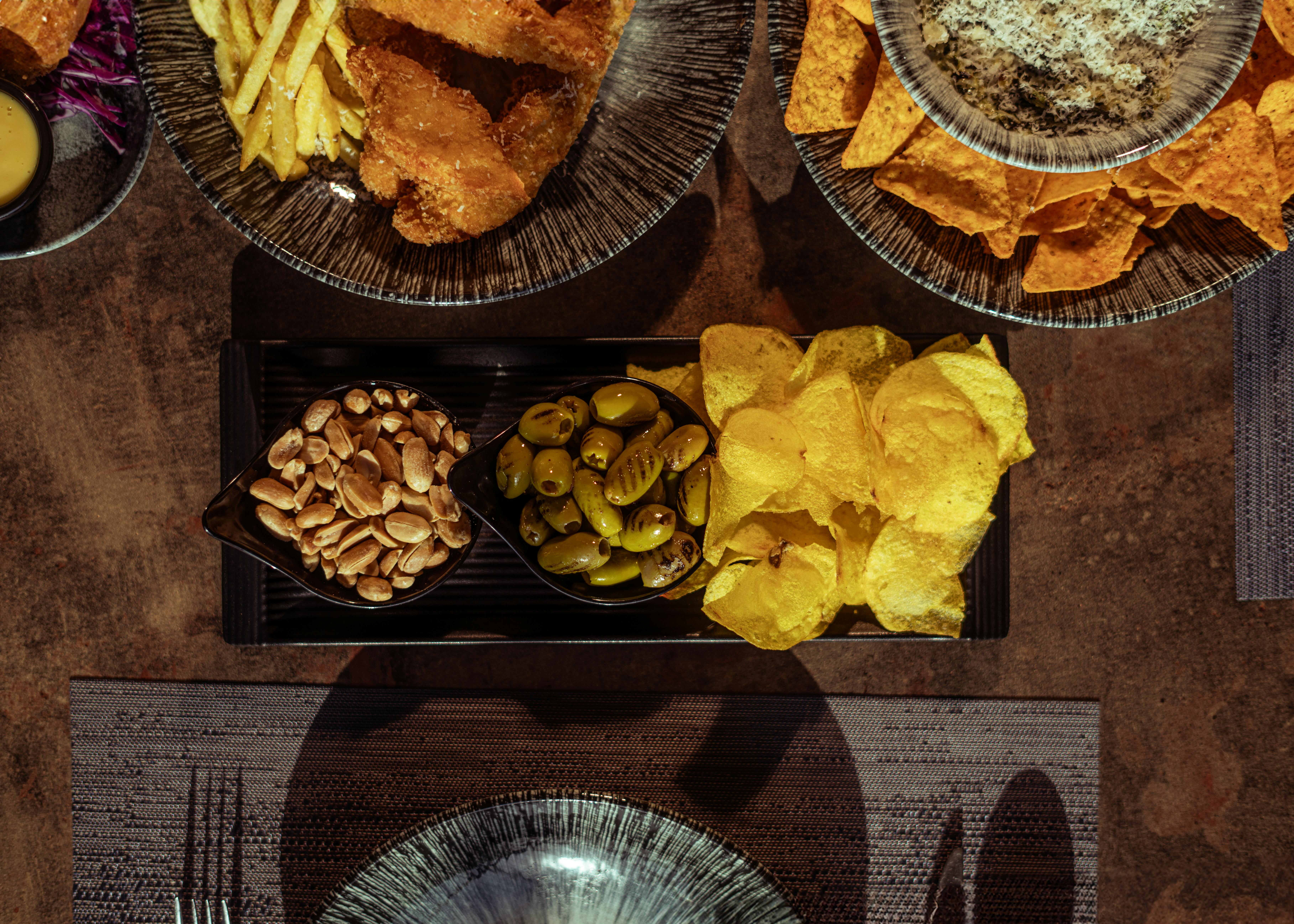 Assorted Snacks Platter with Variety of Appetizers · Free Stock Photo