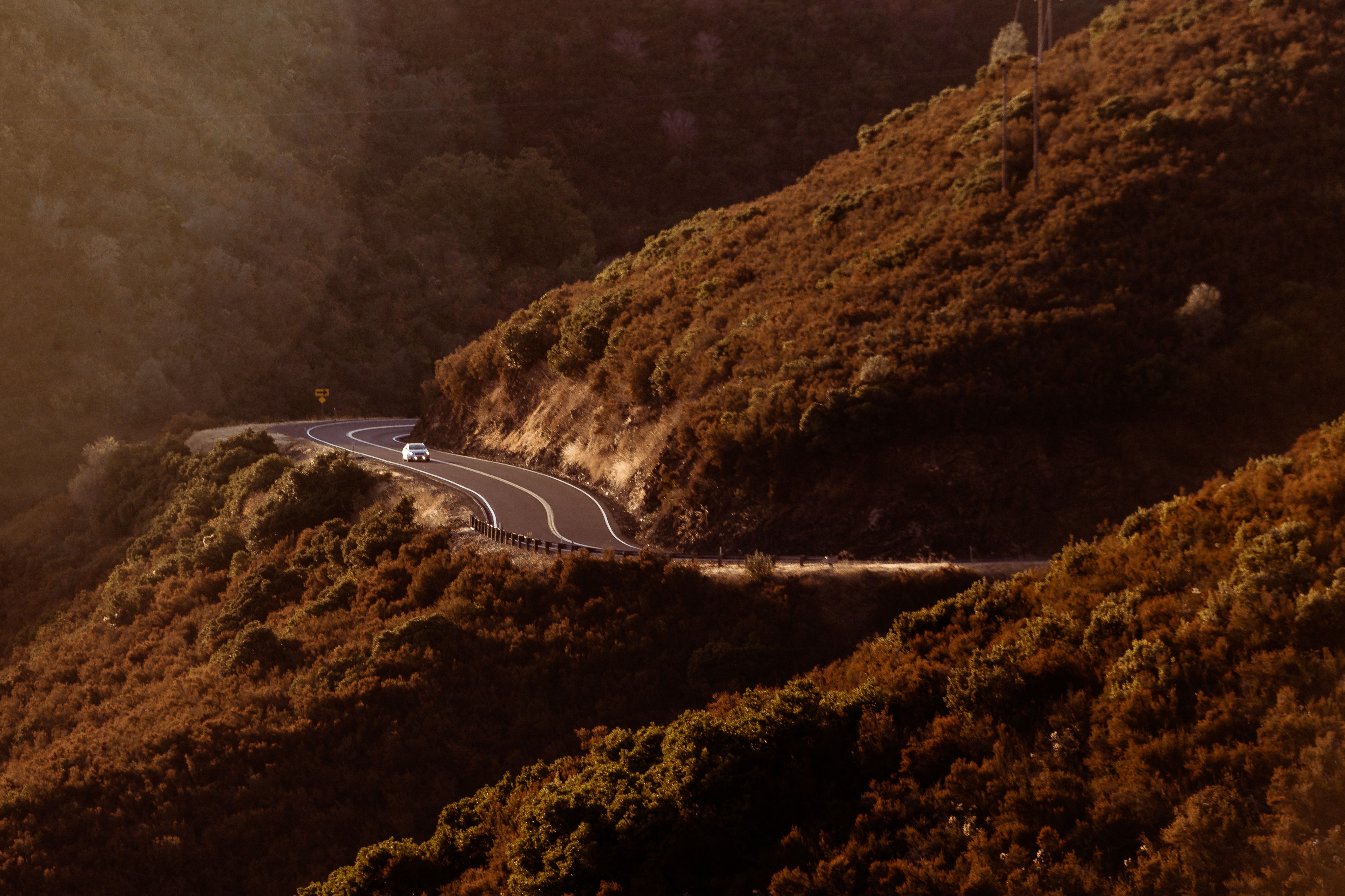 Vehicle Traveling on Road · Free Stock Photo