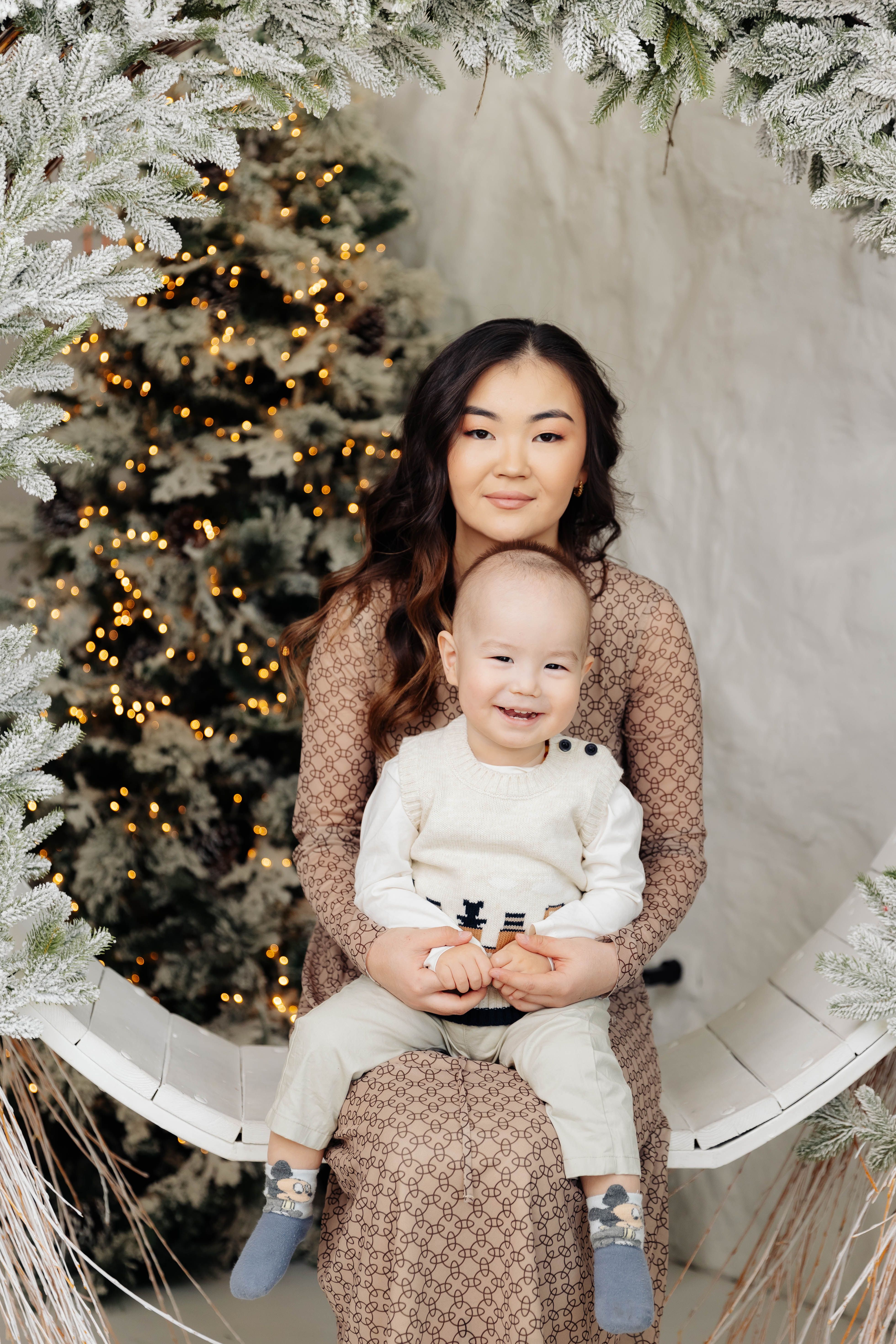 Mother and Child in Winter Wonderland Setting · Free Stock Photo