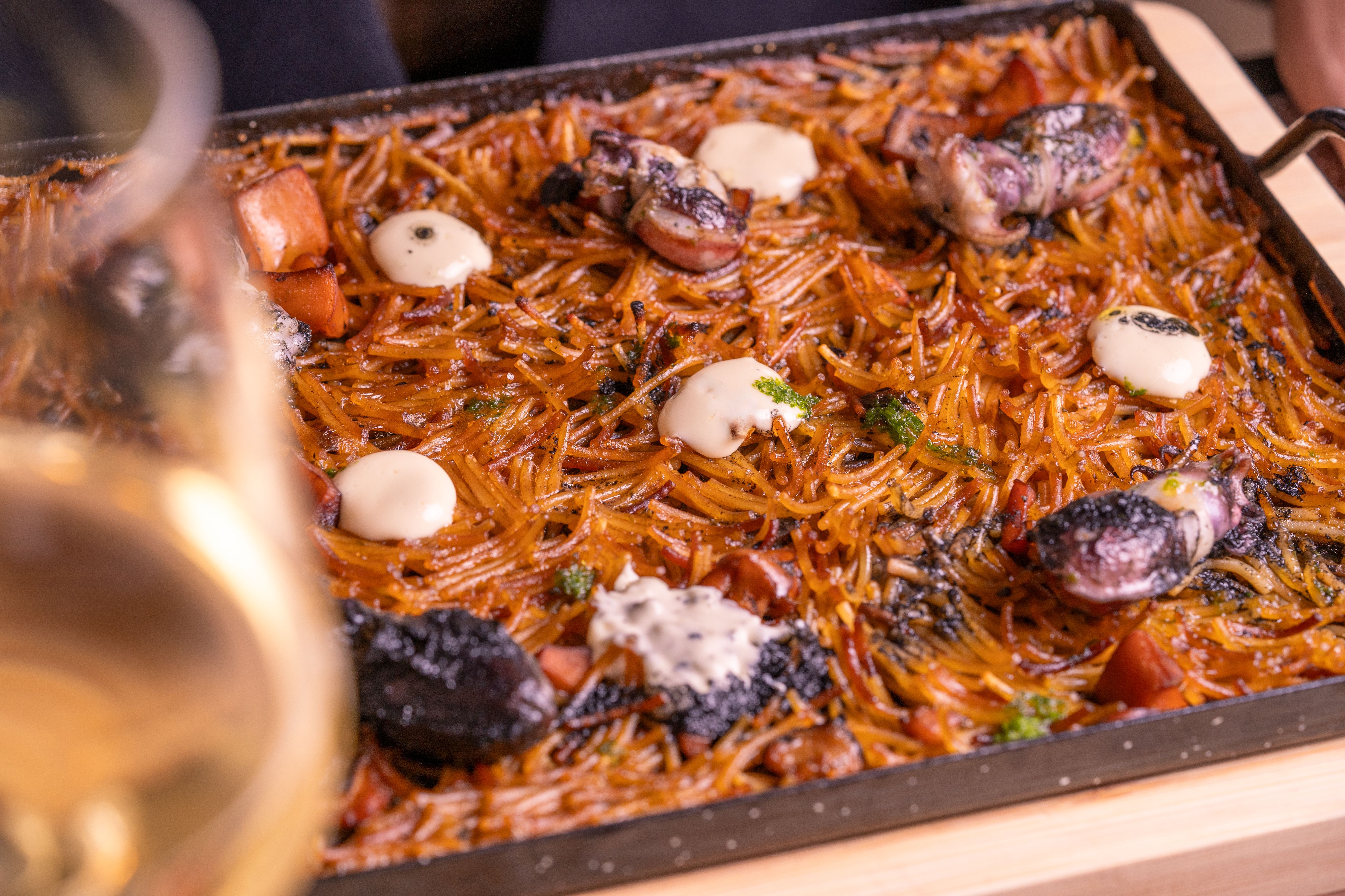 Delicious Fideuà with Seafood and Aioli Topping · Free Stock Photo