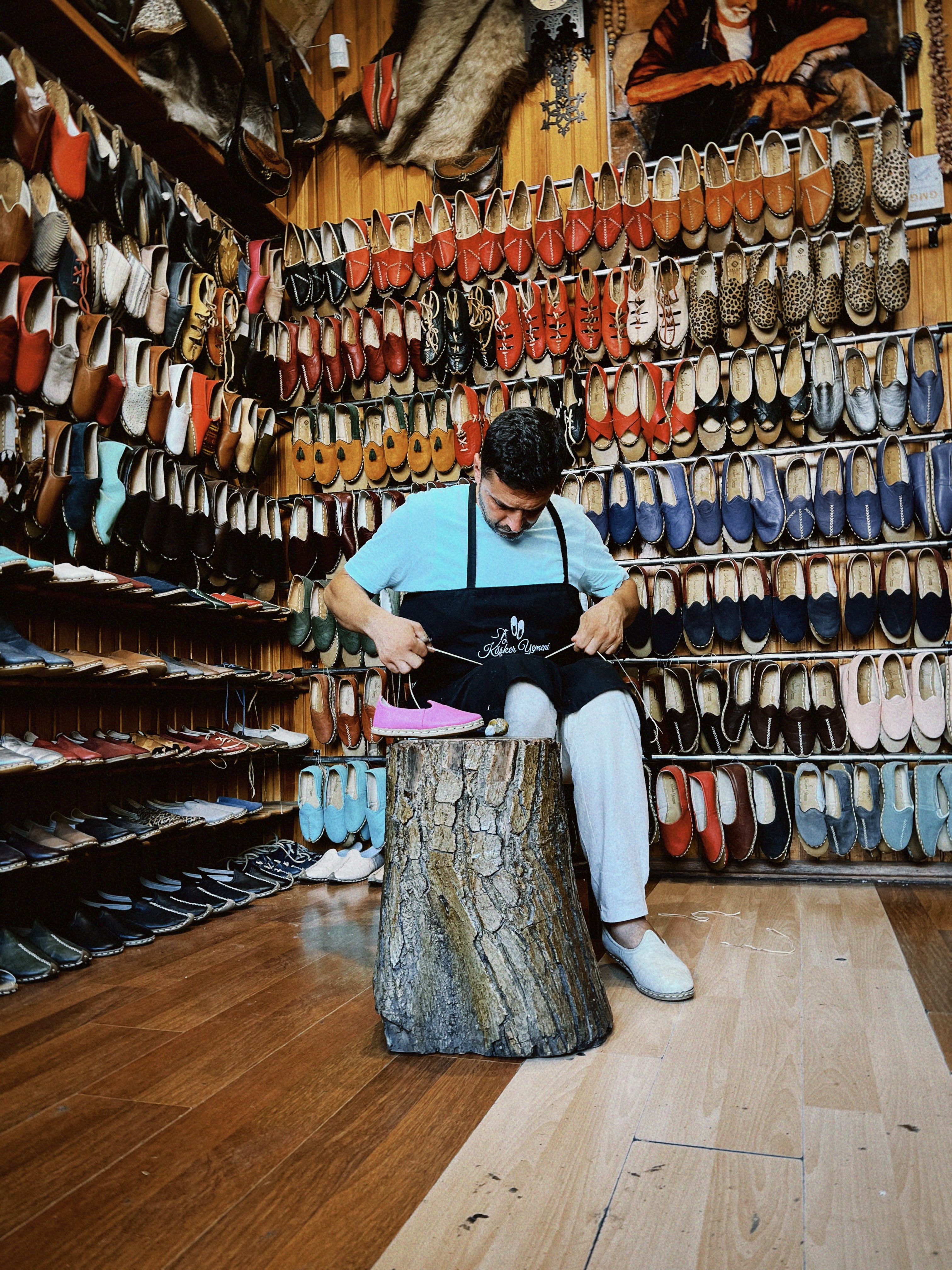 Craftsman at Work in Traditional Shoe Shop · Free Stock Photo