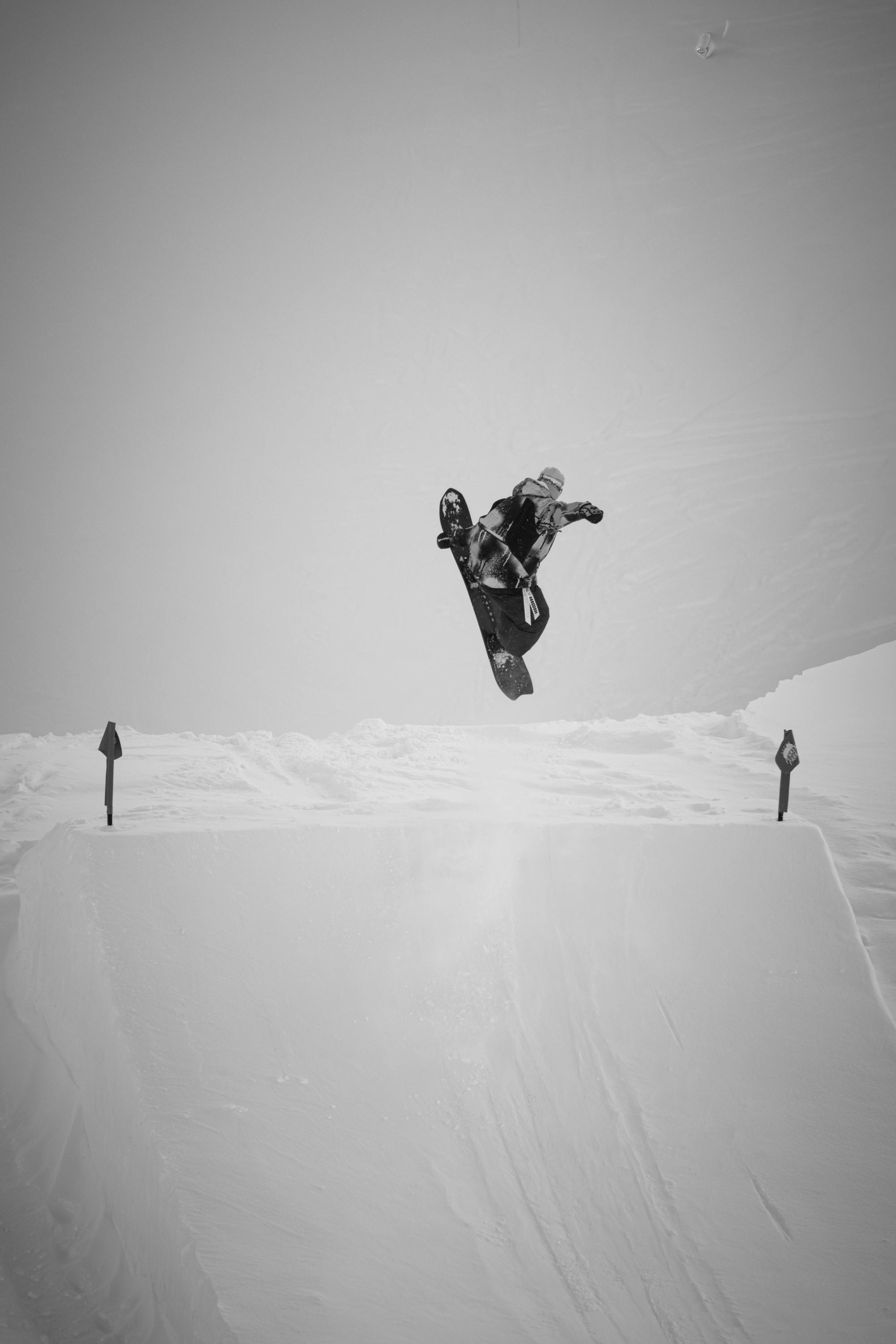 Dynamic Snowboarding Jump in Tyrolean Alps · Free Stock Photo