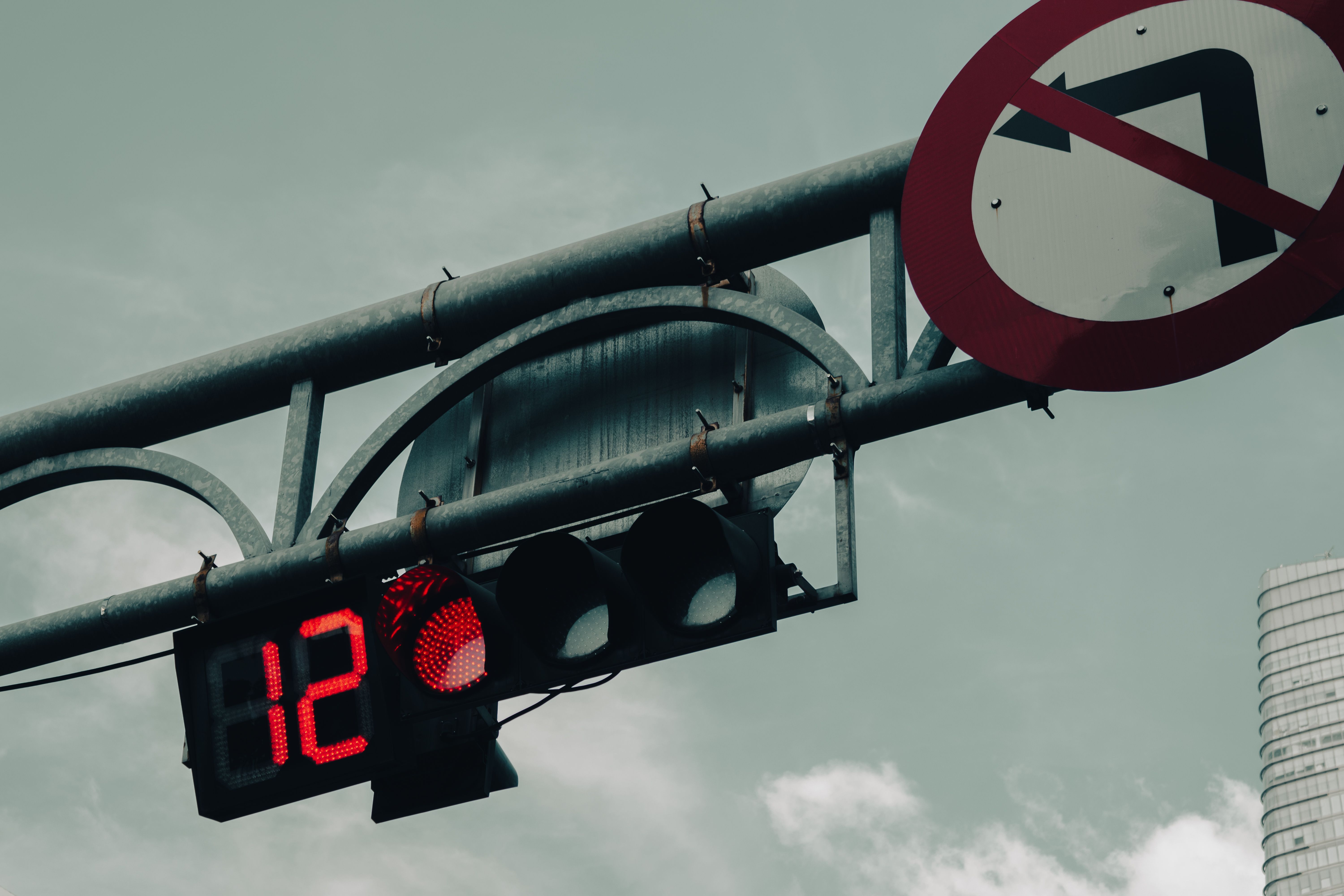 Urban Traffic Light and No Left Turn Sign in Vietnam · Free Stock Photo