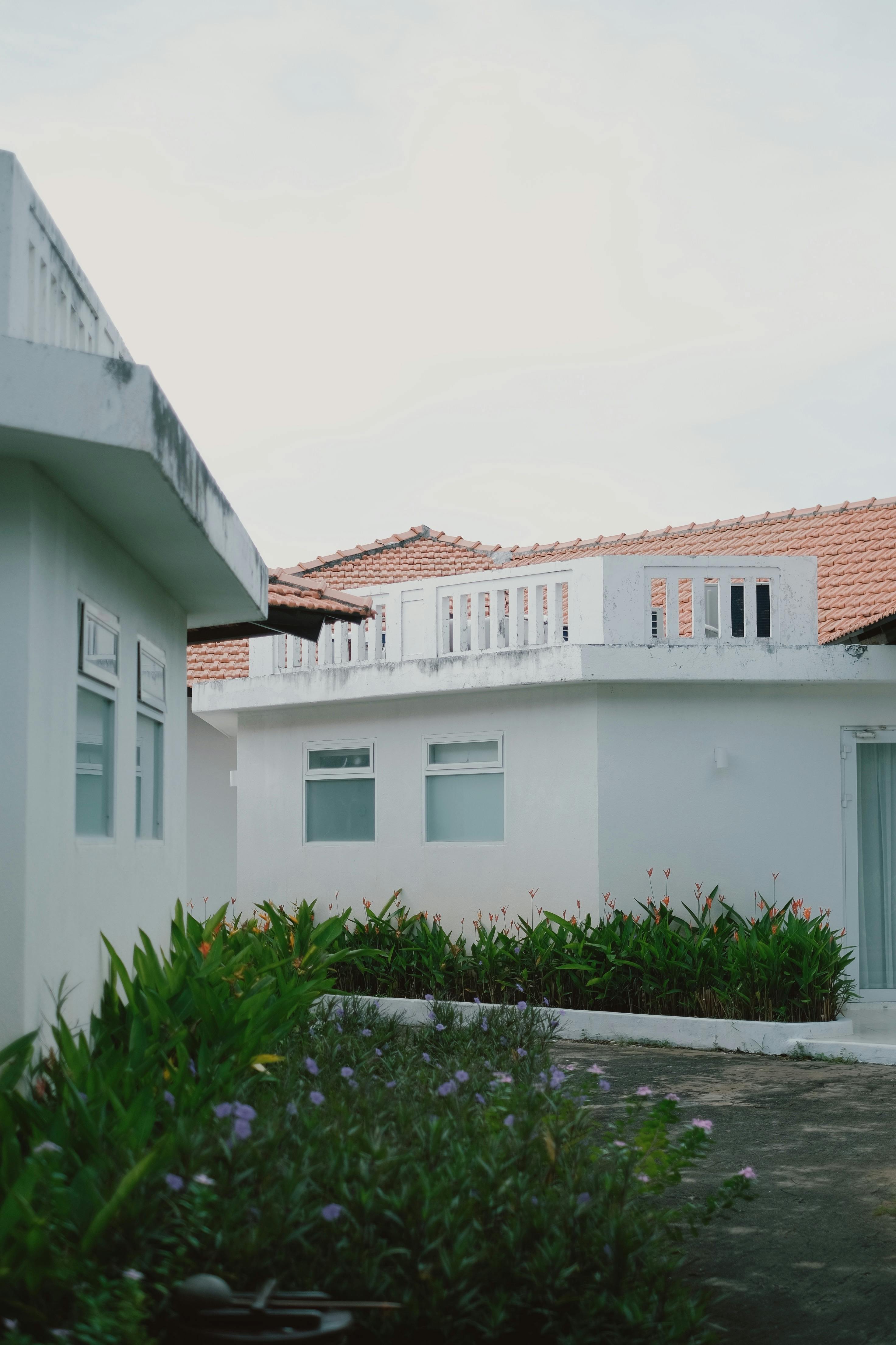 Charming Suburban Homes with Red Tile Roofs · Free Stock Photo