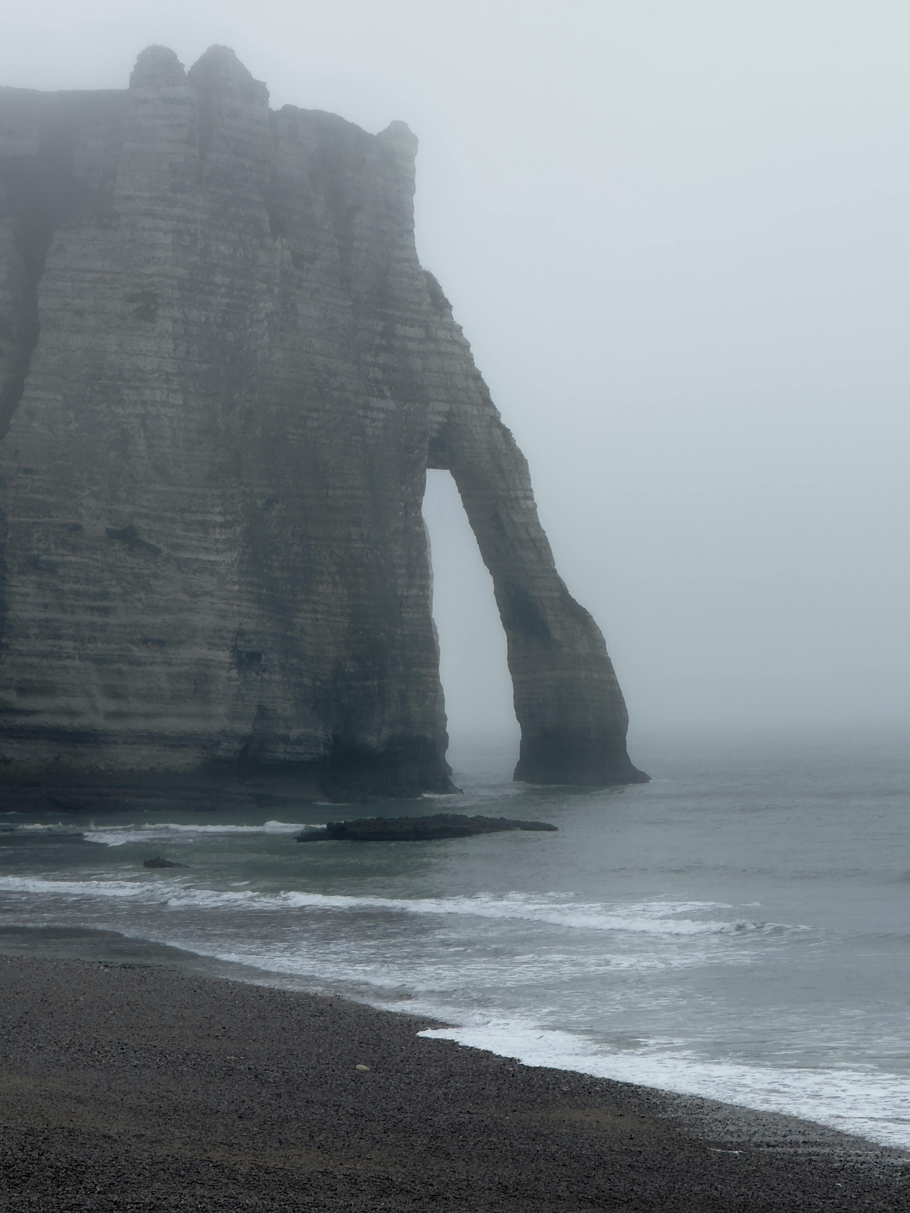 Rock Cliff Near Seashore · Free Stock Photo