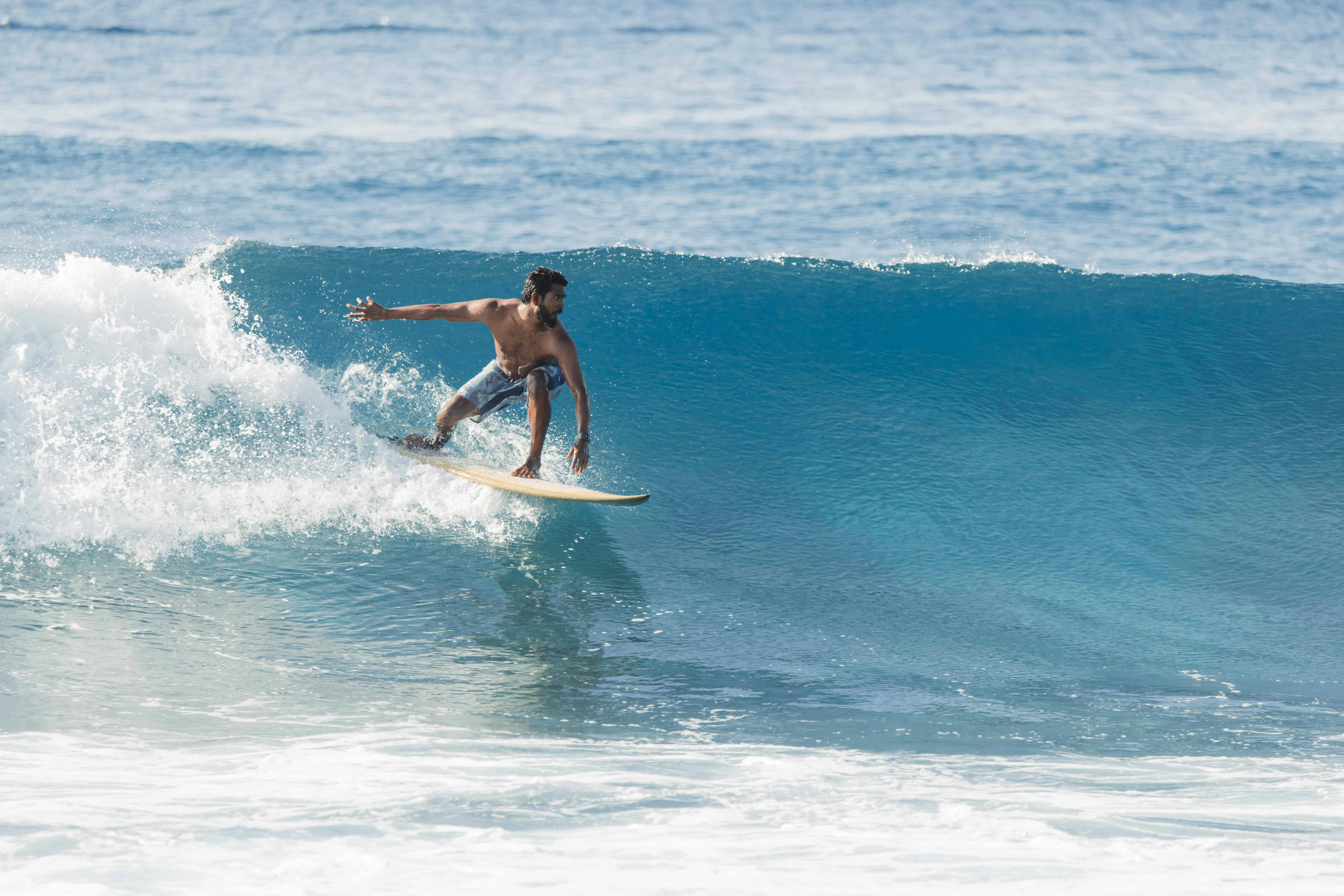 Exciting Surfing Adventure in the Maldives · Free Stock Photo