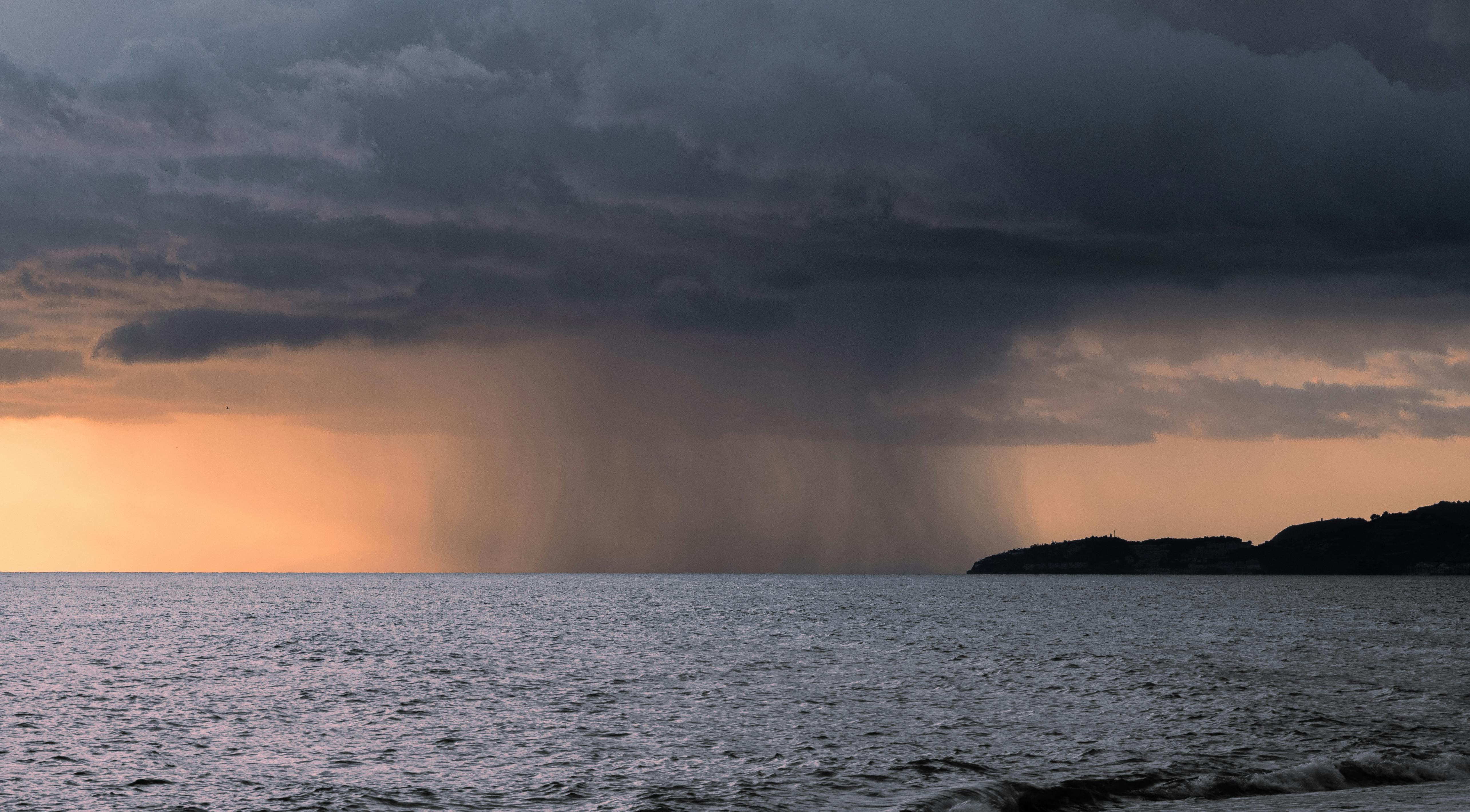 Dramatic Ocean Storm at Sunset · Free Stock Photo