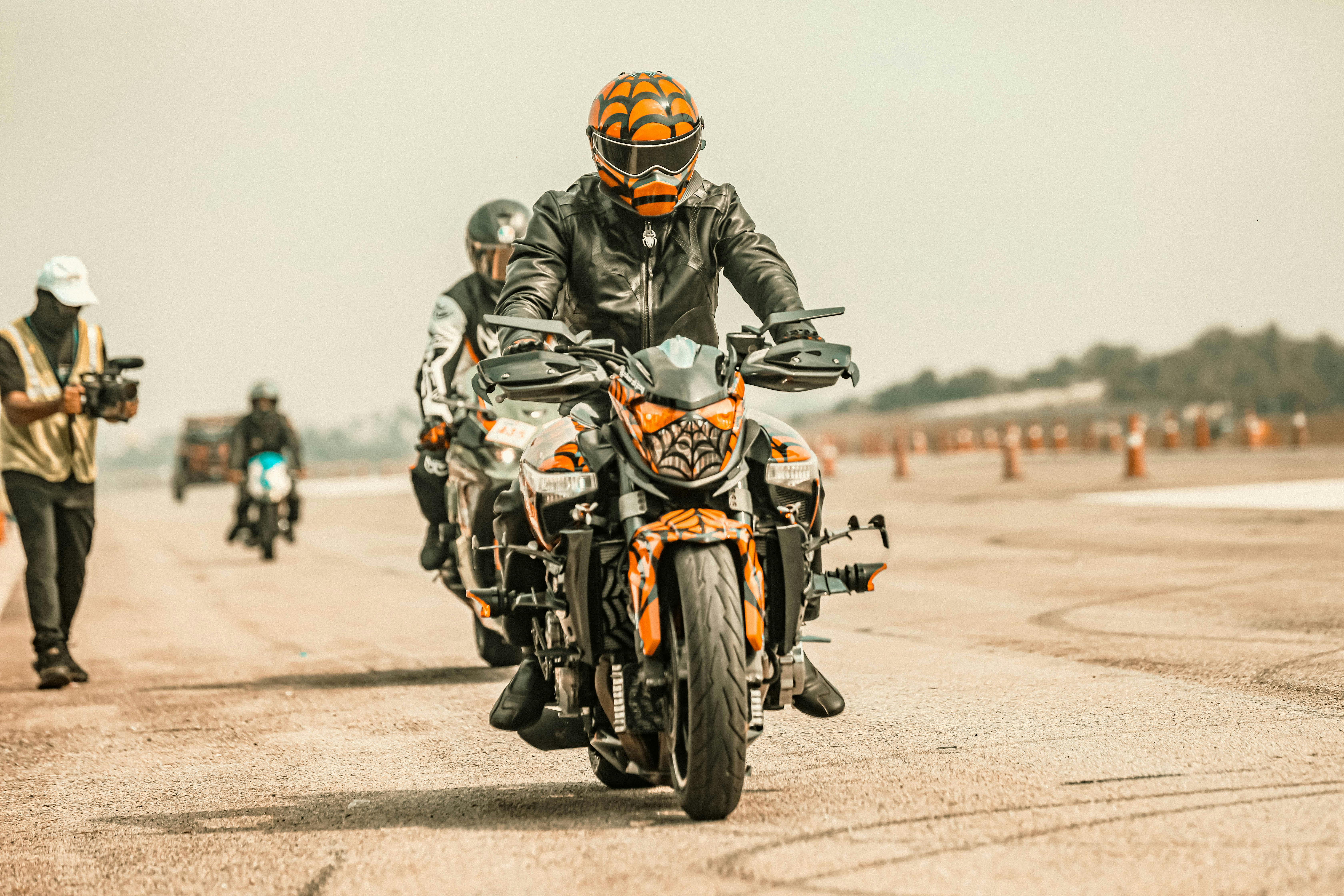 Intense Motorcycle Drag Race in Action · Free Stock Photo