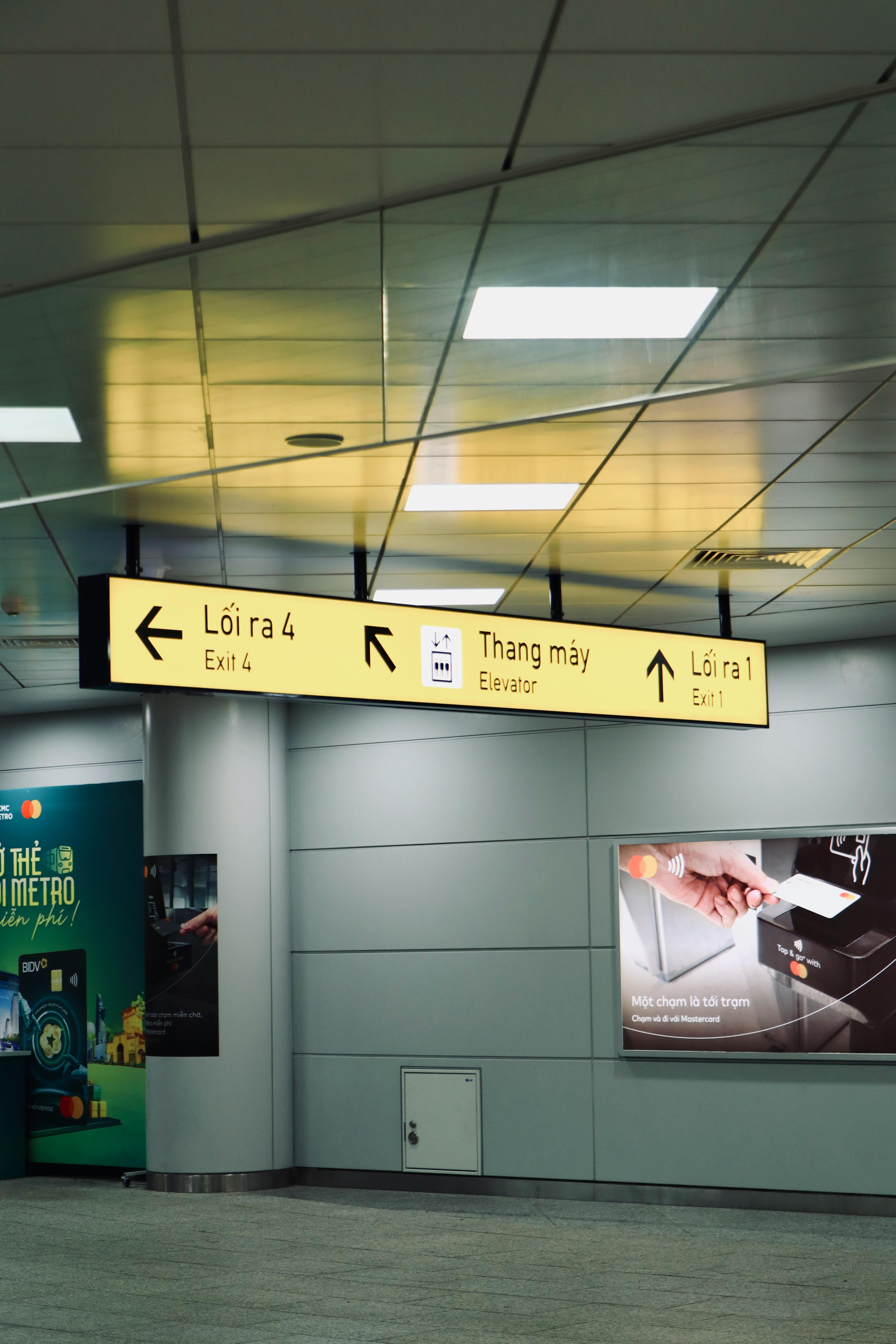 Vietnam Airport Exit and Elevator Signs · Free Stock Photo