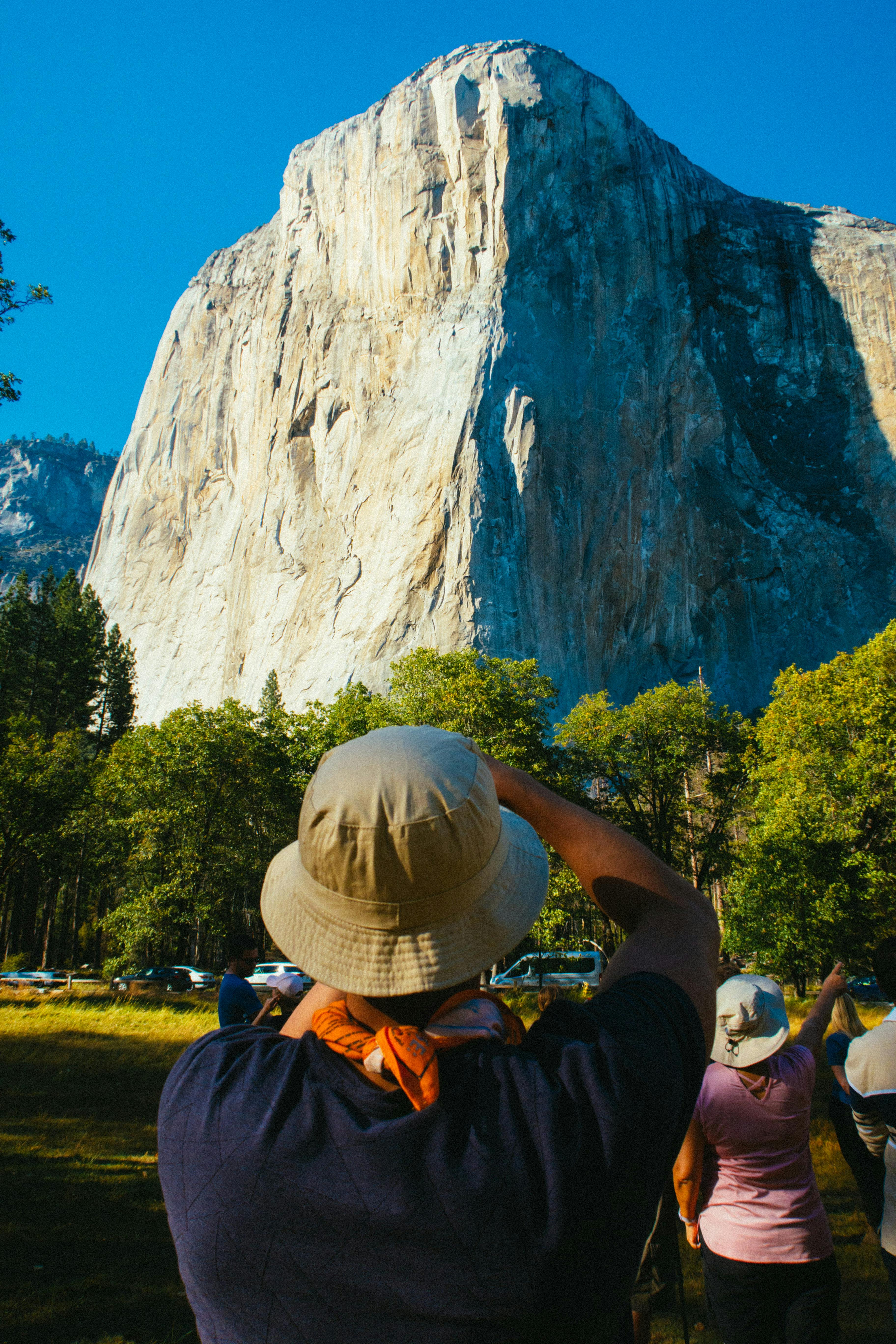 People Looking at Rock · Free Stock Photo