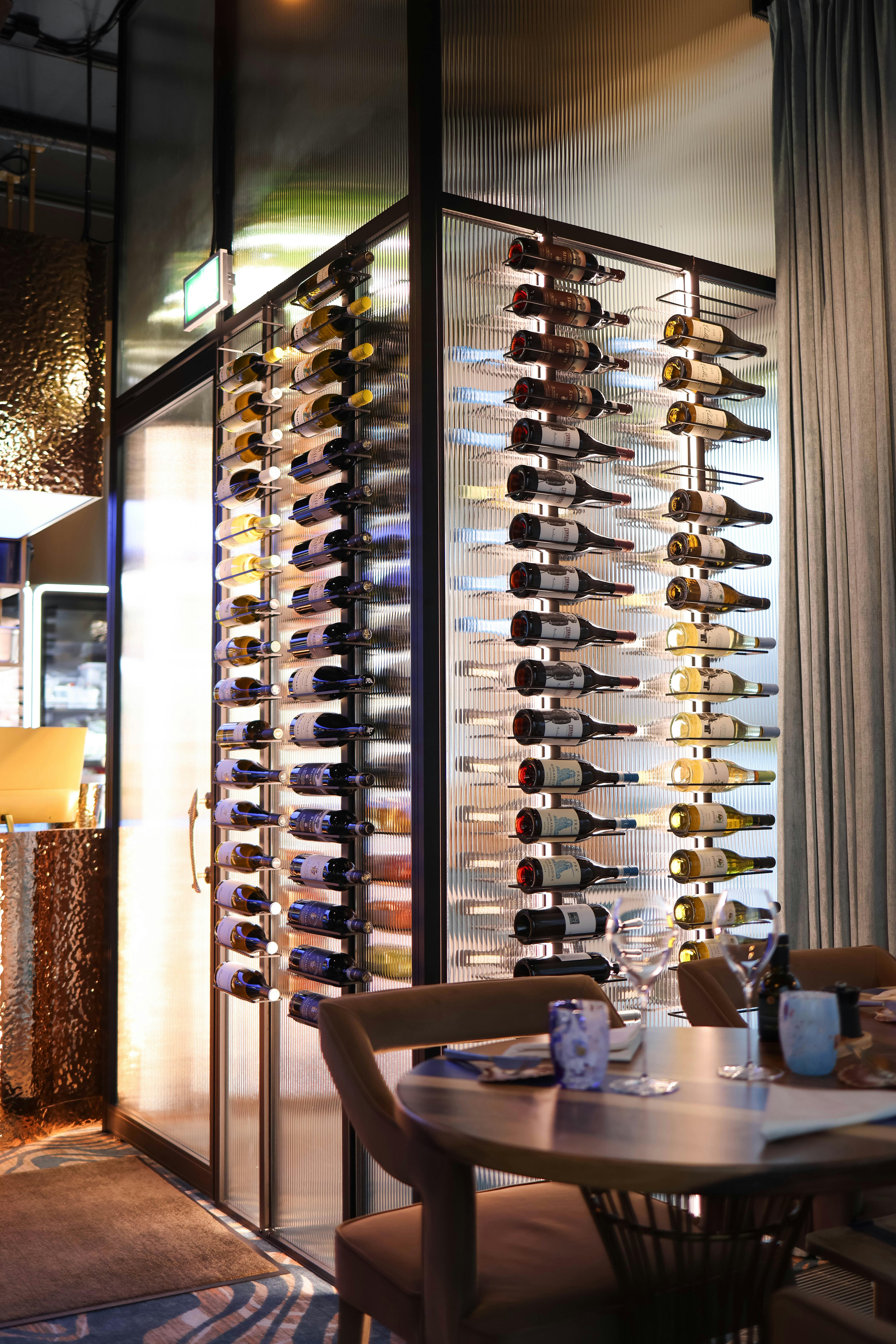 Elegant Restaurant Wine Display Interior · Free Stock Photo