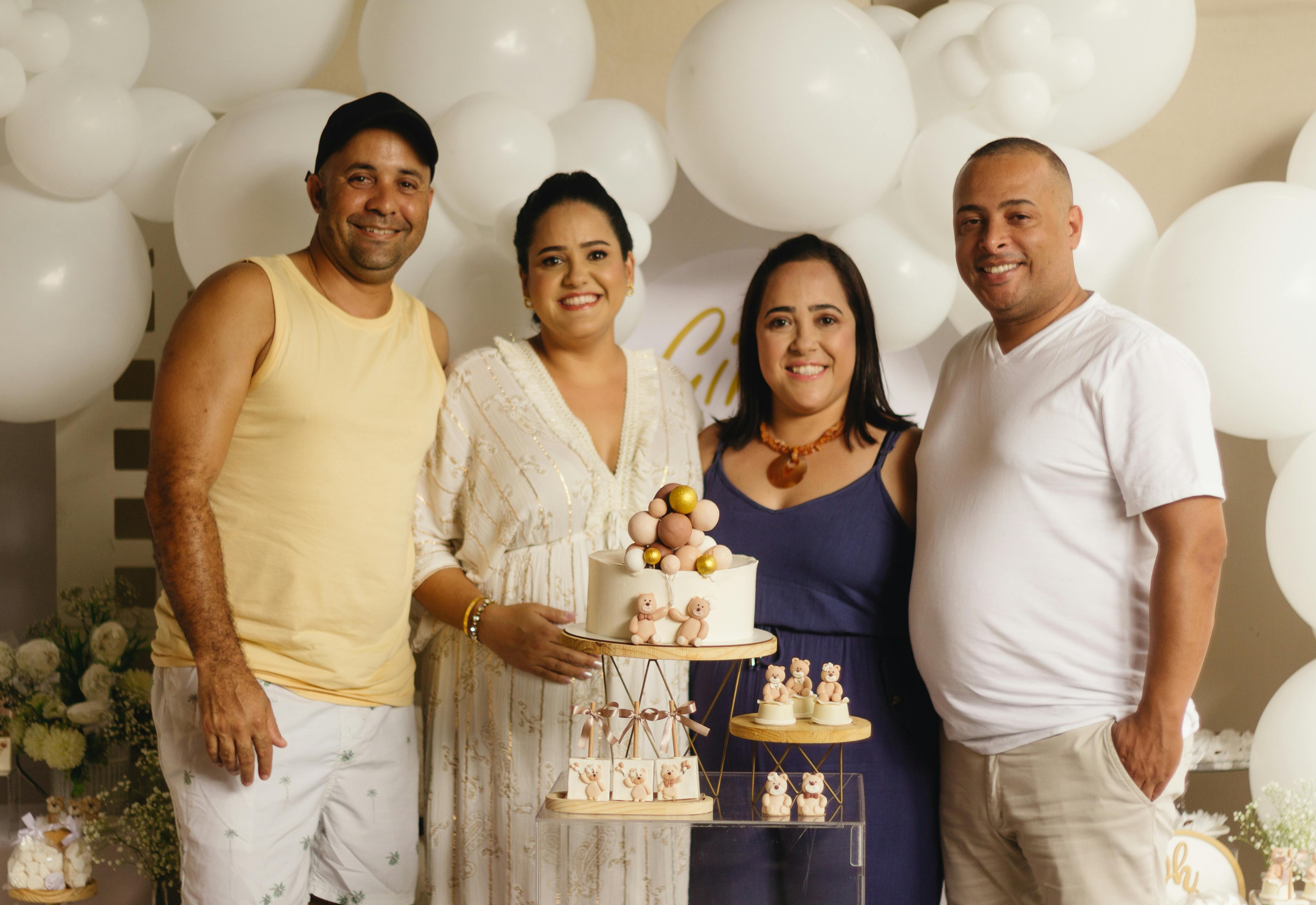 Family Celebration with Cake and Decorations · Free Stock Photo