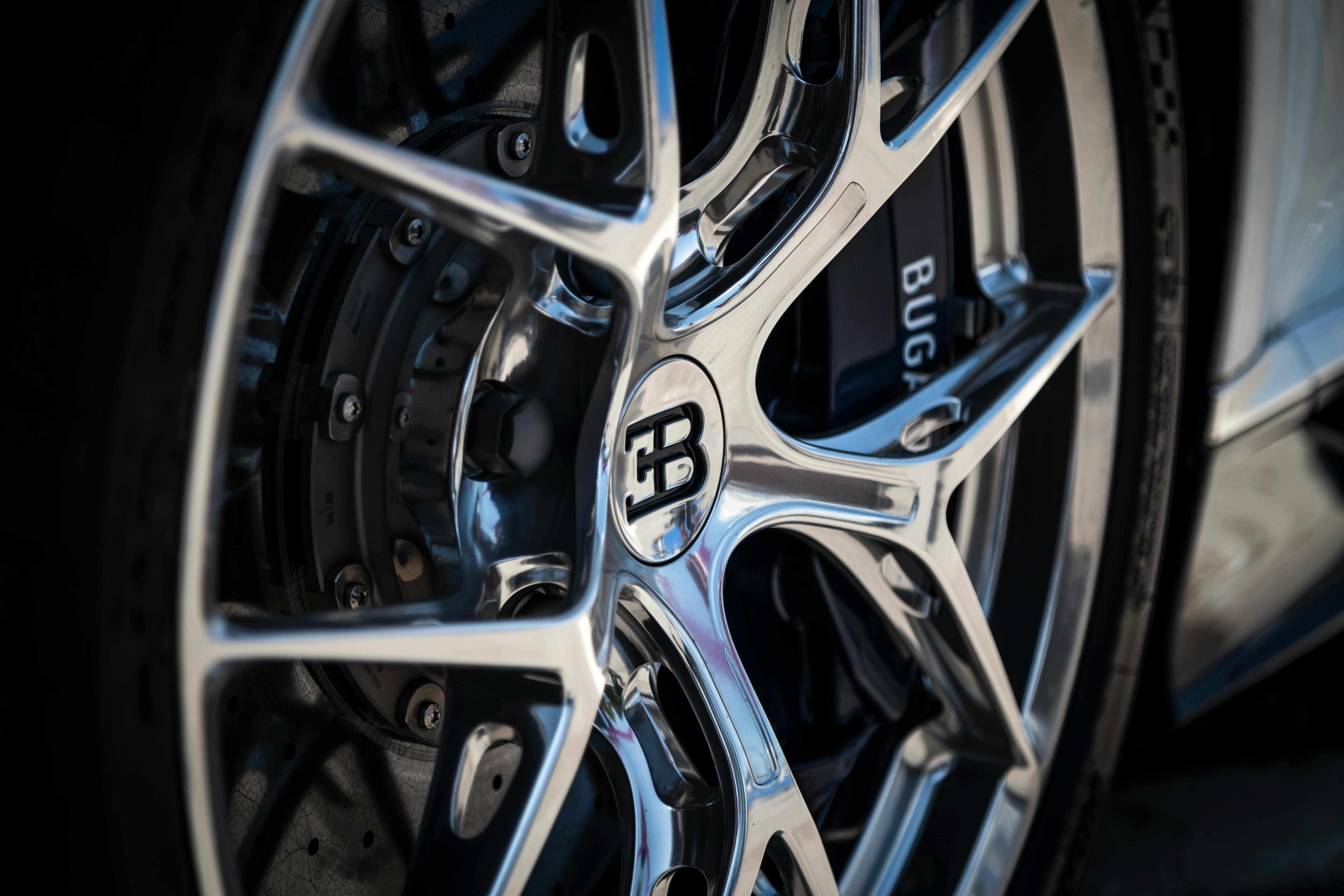 Close-Up of Elegant Supercar Wheel Rim · Free Stock Photo