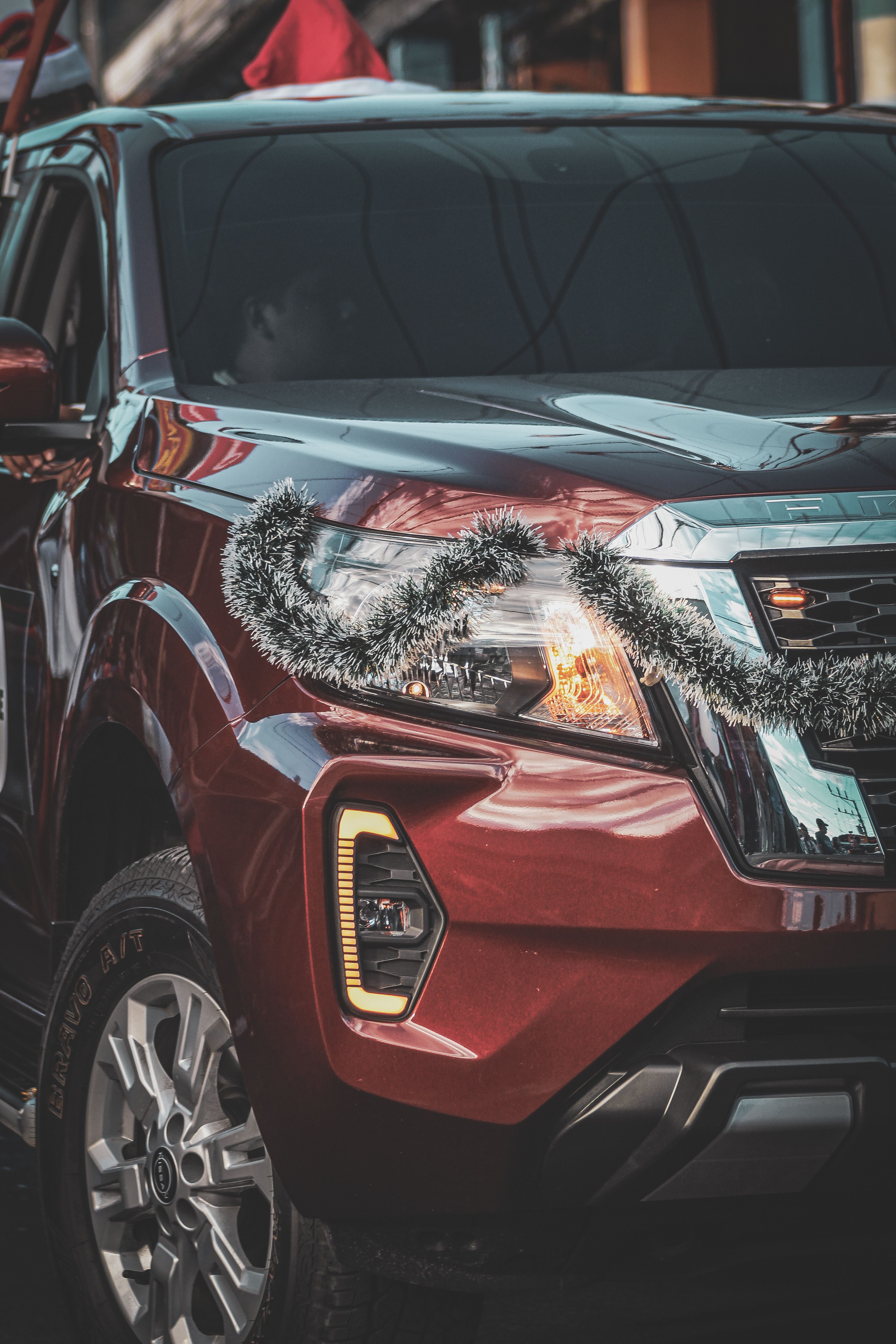 Festively Decorated Red SUV with Holiday Wreath · Free Stock Photo