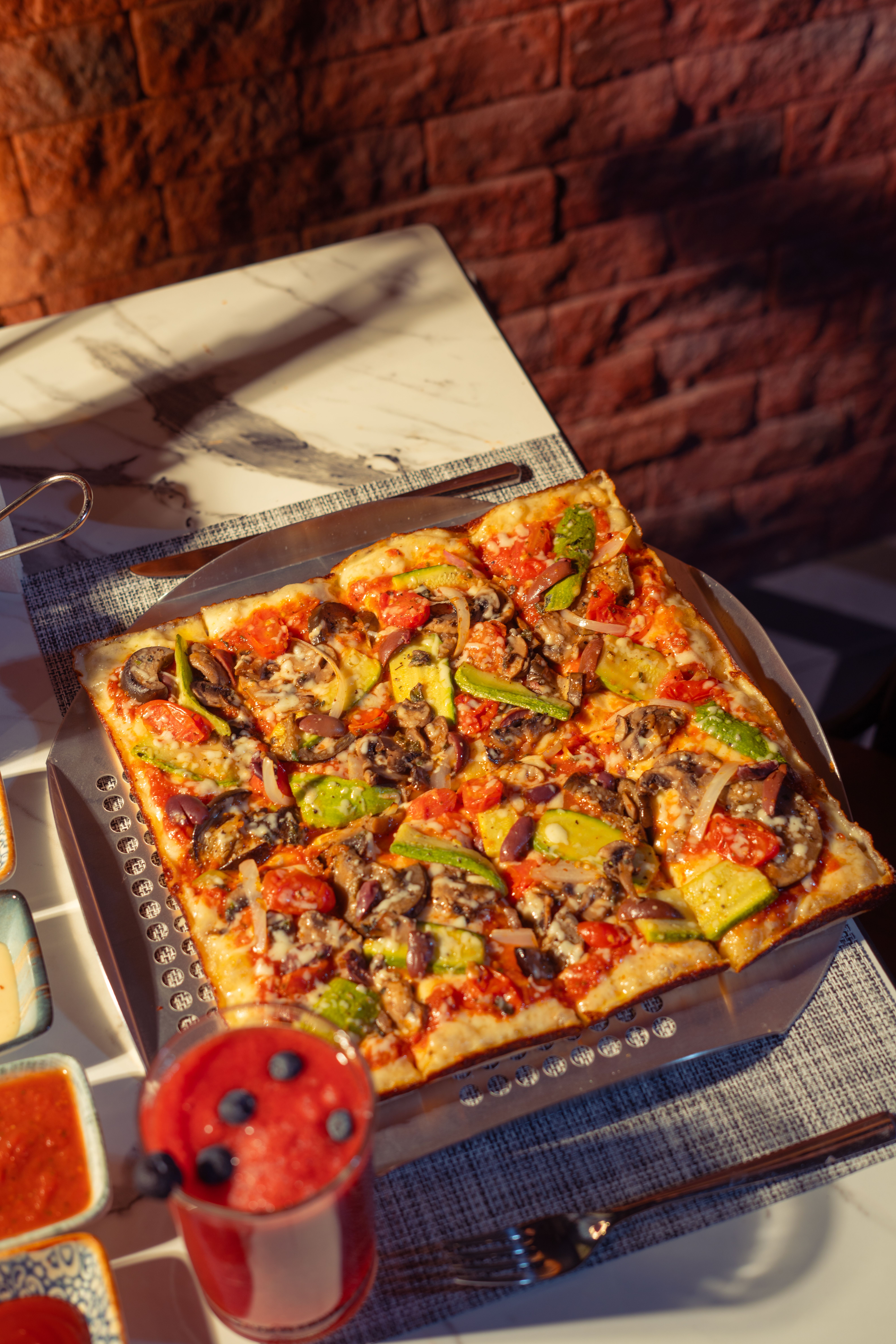 Square Pizza with Vegetables on Rustic Table · Free Stock Photo