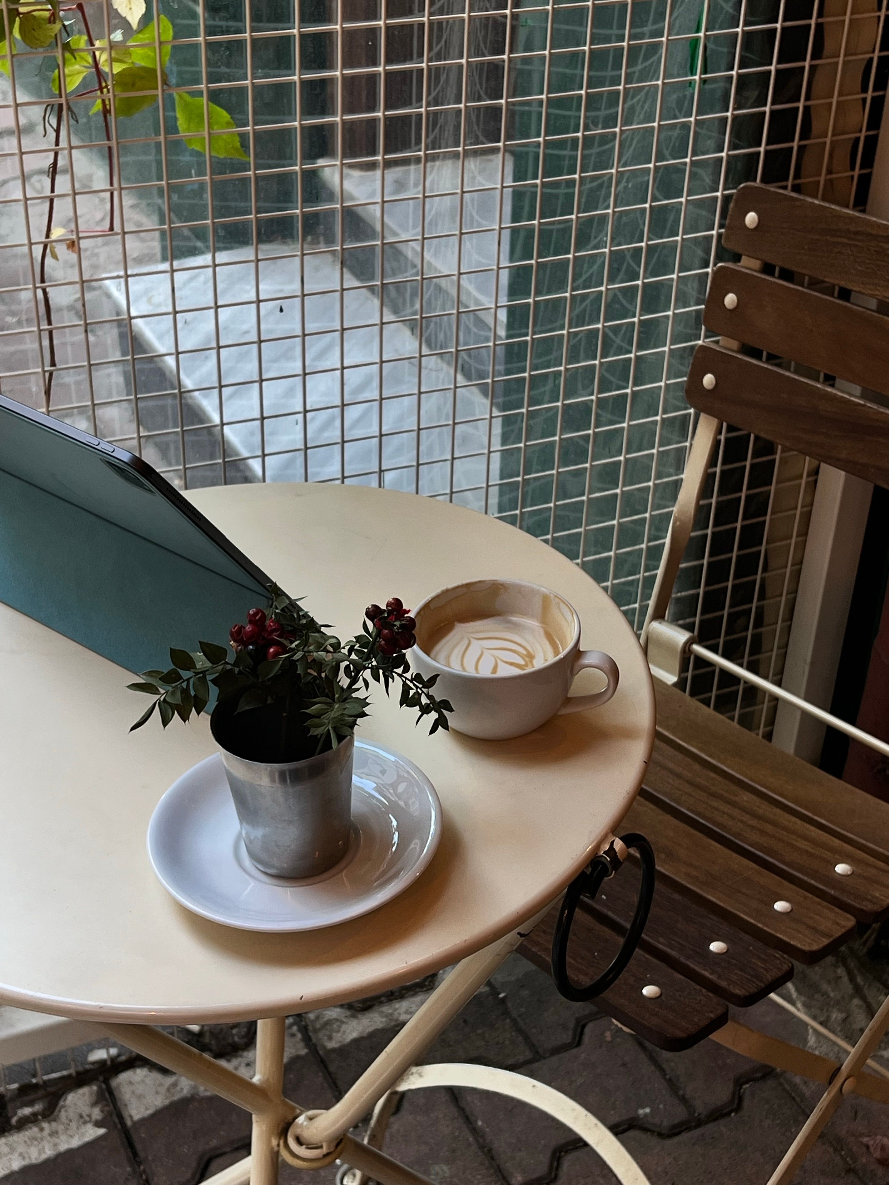 Cozy Cafe Table with Coffee and Tablet · Free Stock Photo