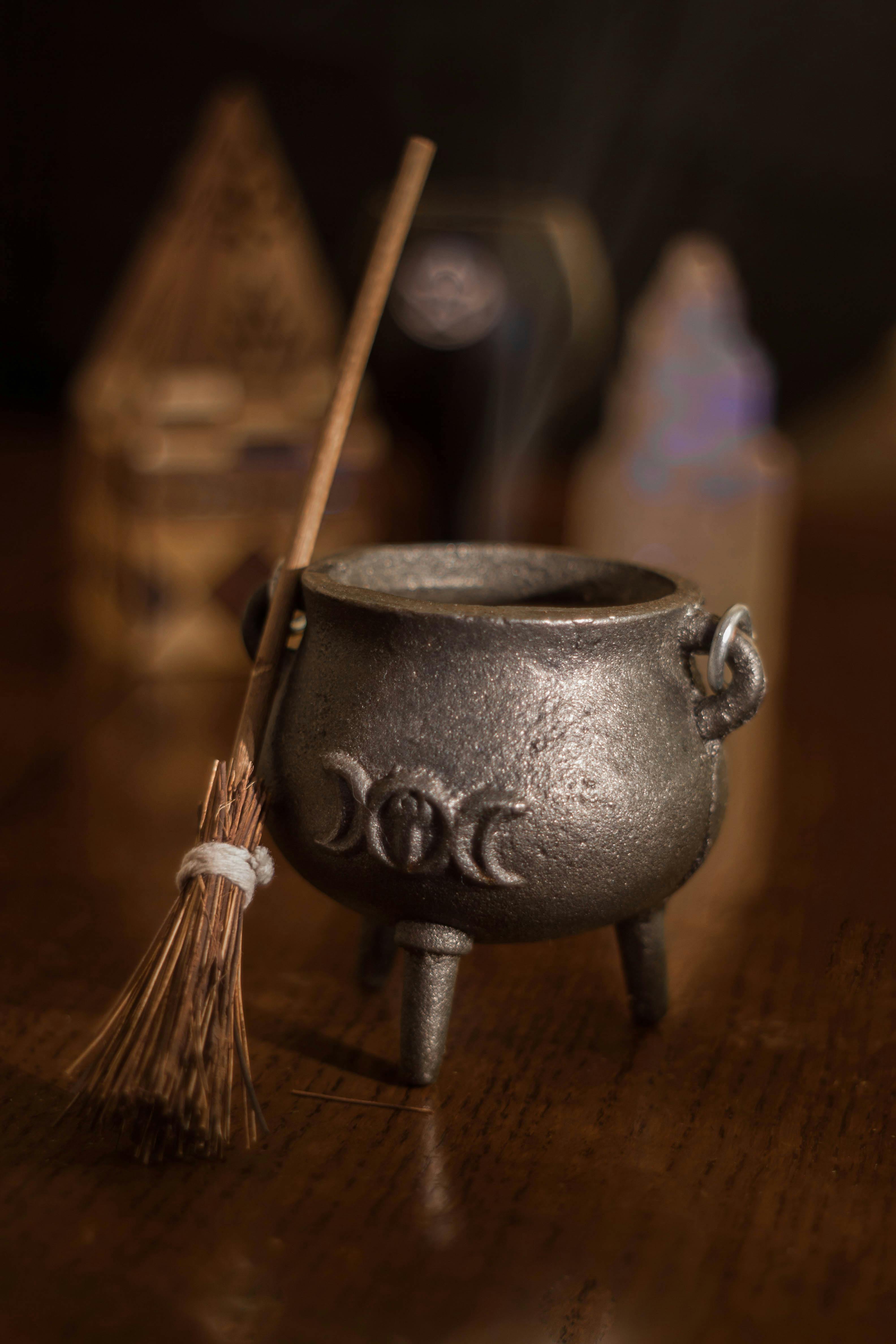 Mystical Miniature Cauldron with Broomstick · Free Stock Photo