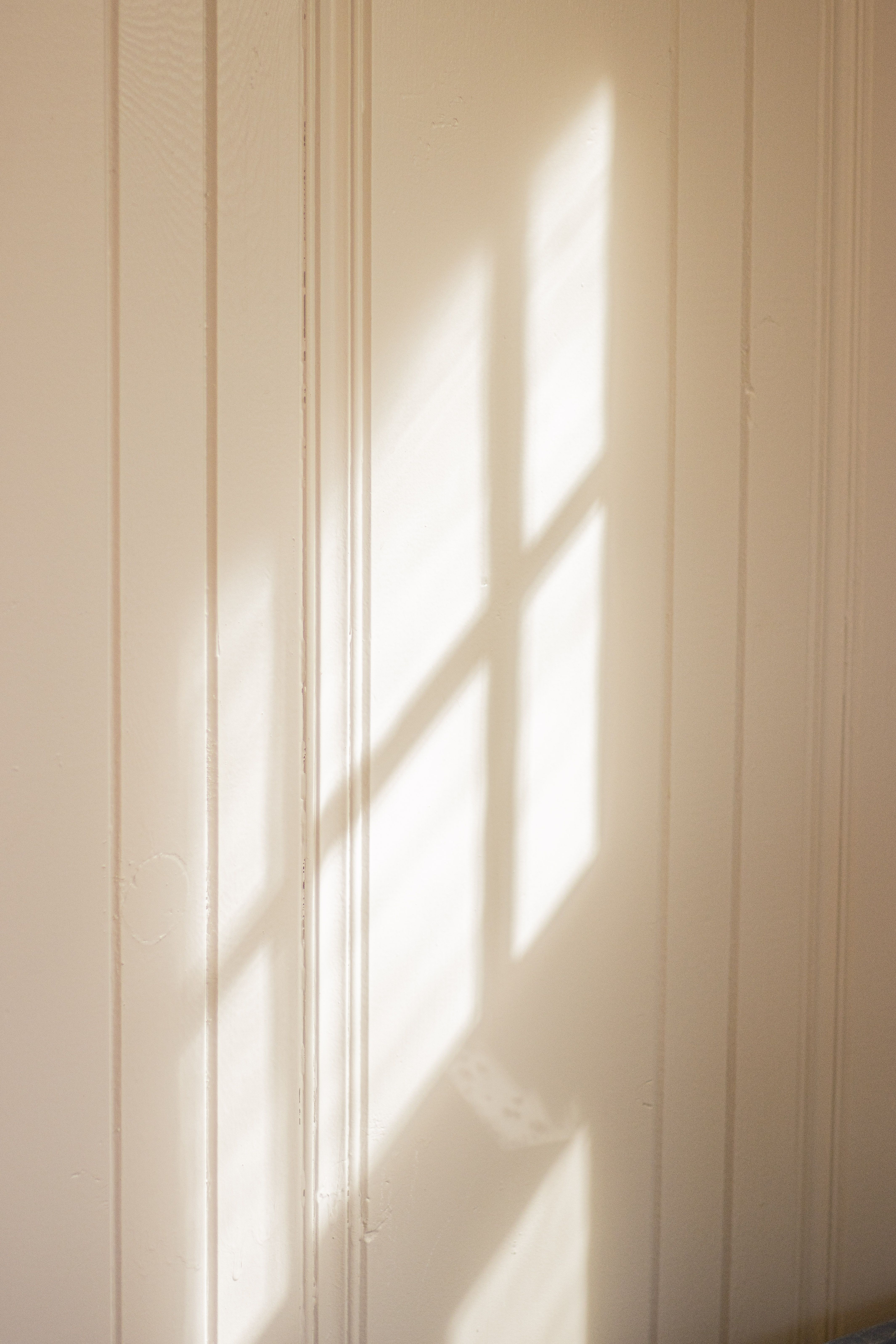 Window shadow on wall and floor of modern room · Free Stock Photo