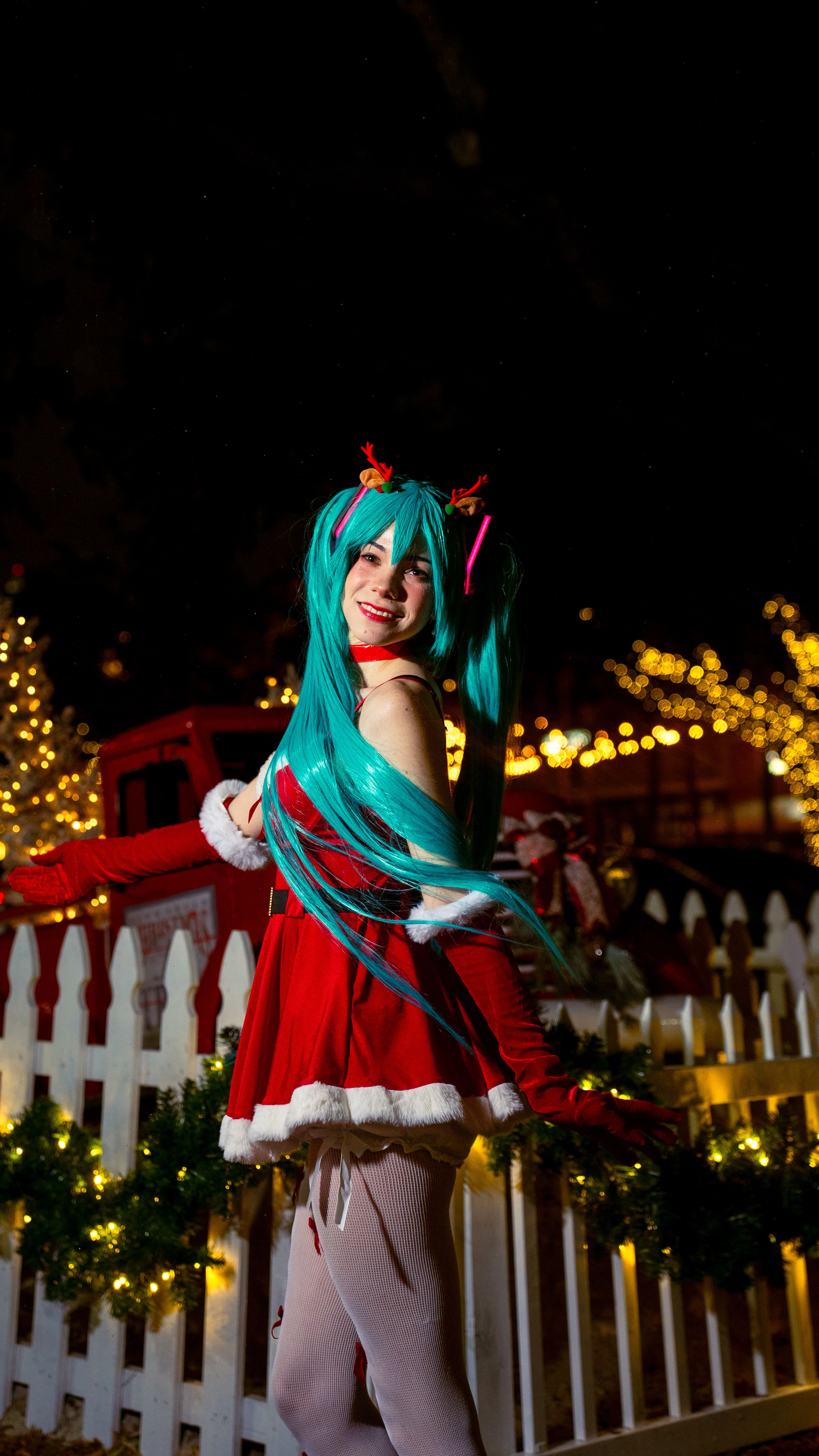 Vibrant Christmas Cosplay in Festive Night Setting · Free Stock Photo
