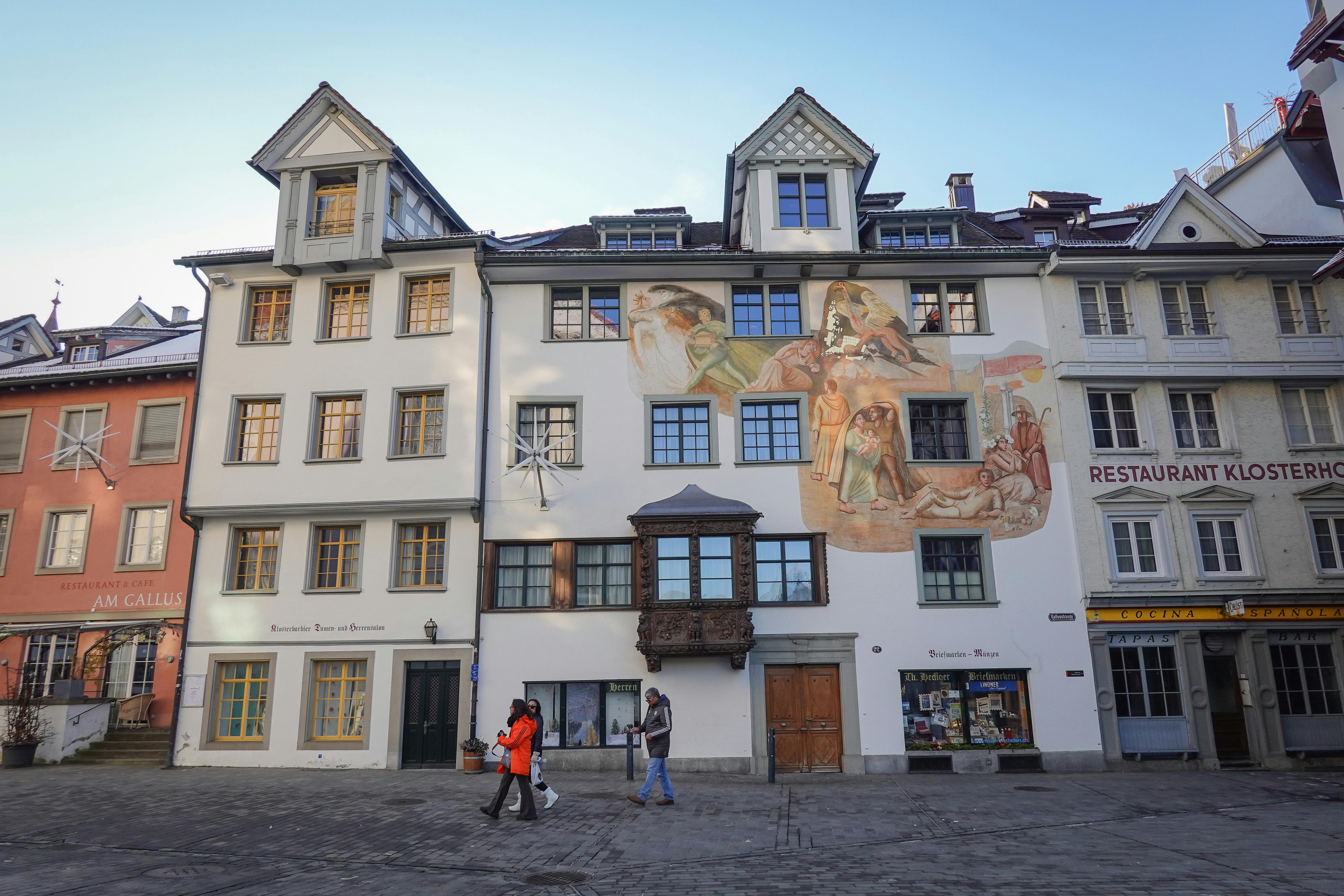 Charming Swiss Street with Historic Murals · Free Stock Photo
