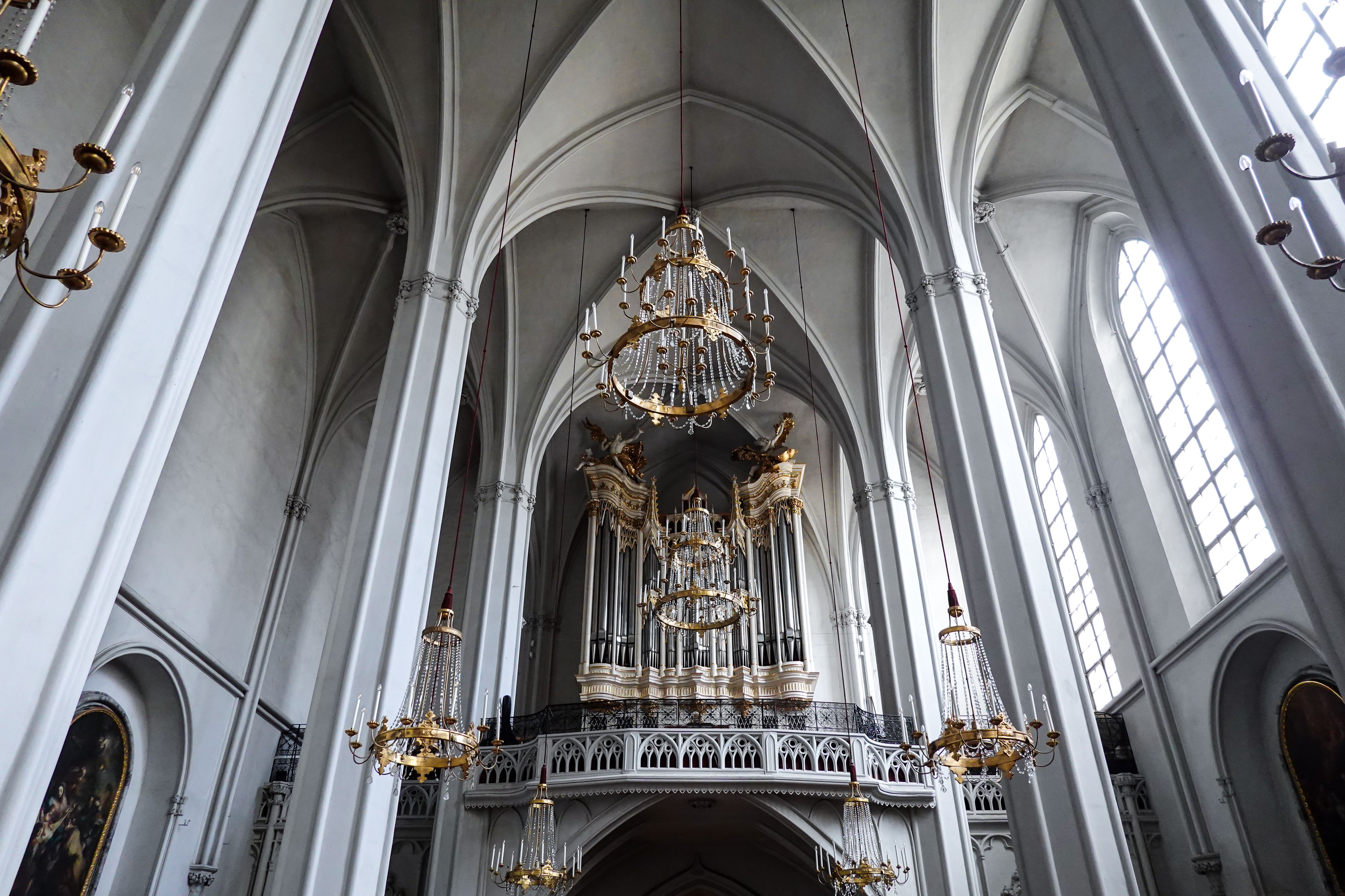 Gothic Cathedral Interior with Chandeliers · Free Stock Photo