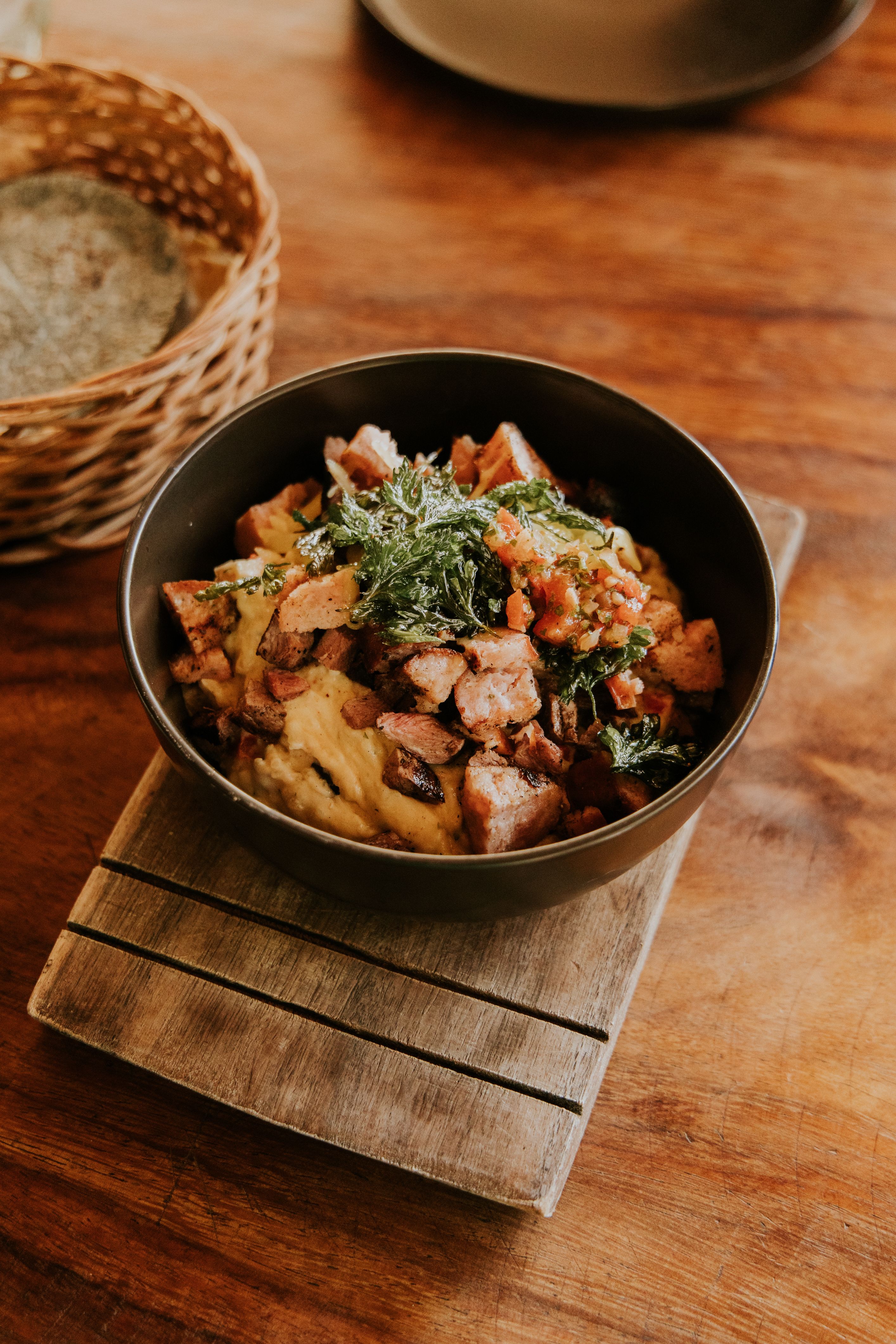 Delicious Hearty Meal in a Rustic Bowl · Free Stock Photo