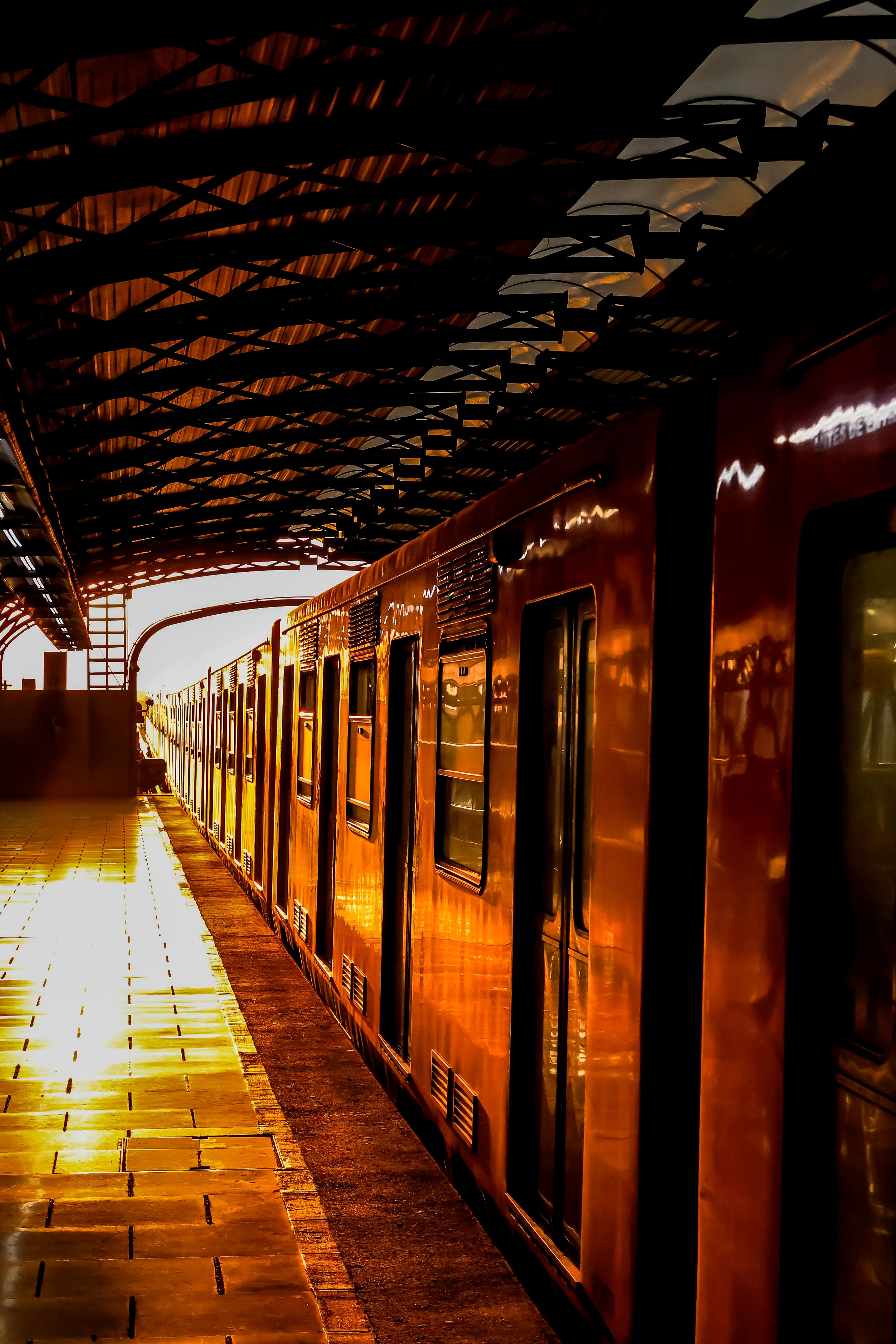 Golden Hour Train at Vintage Station Platform · Free Stock Photo
