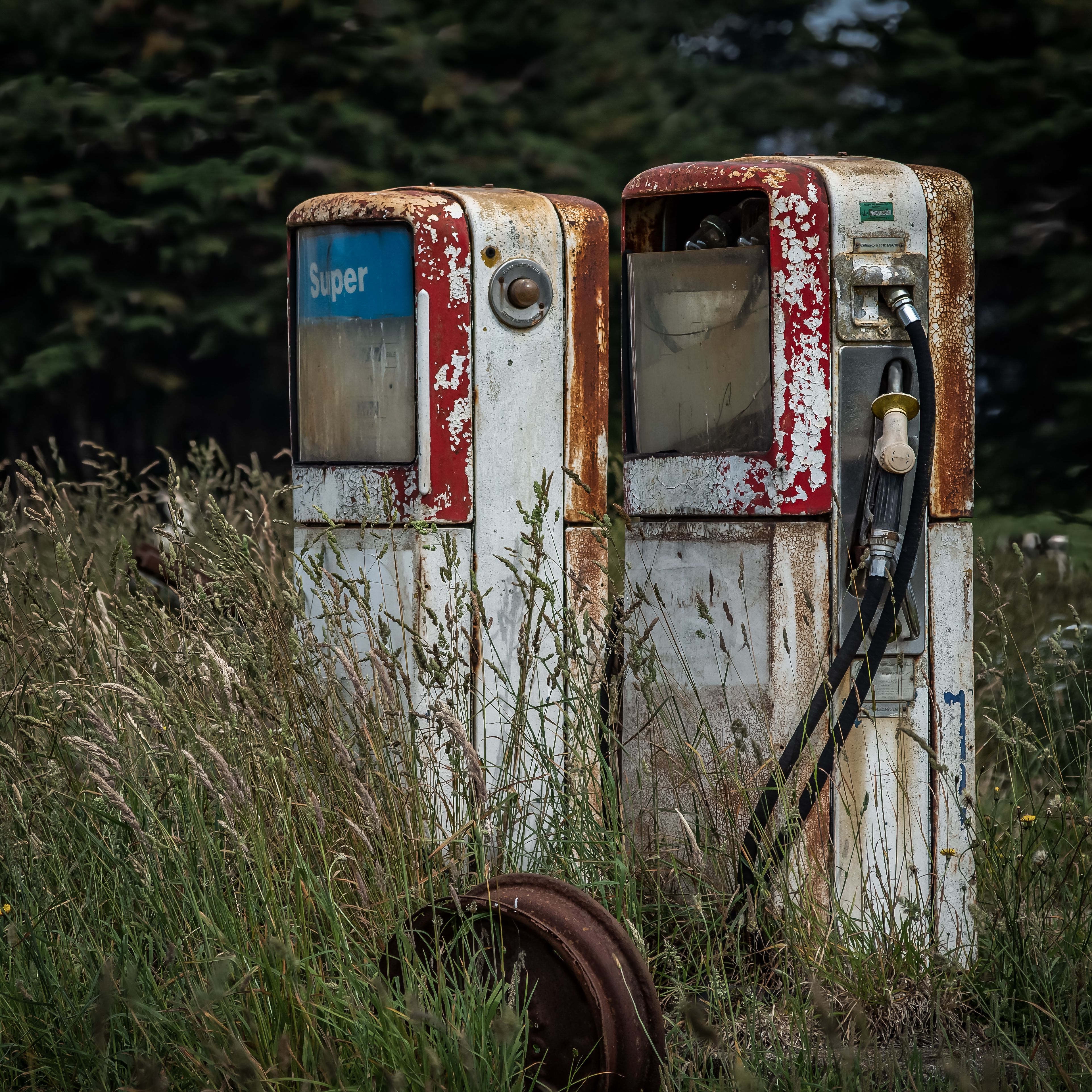 Rusty Abandoned Gas Pumps in Tasmania Field · Free Stock Photo