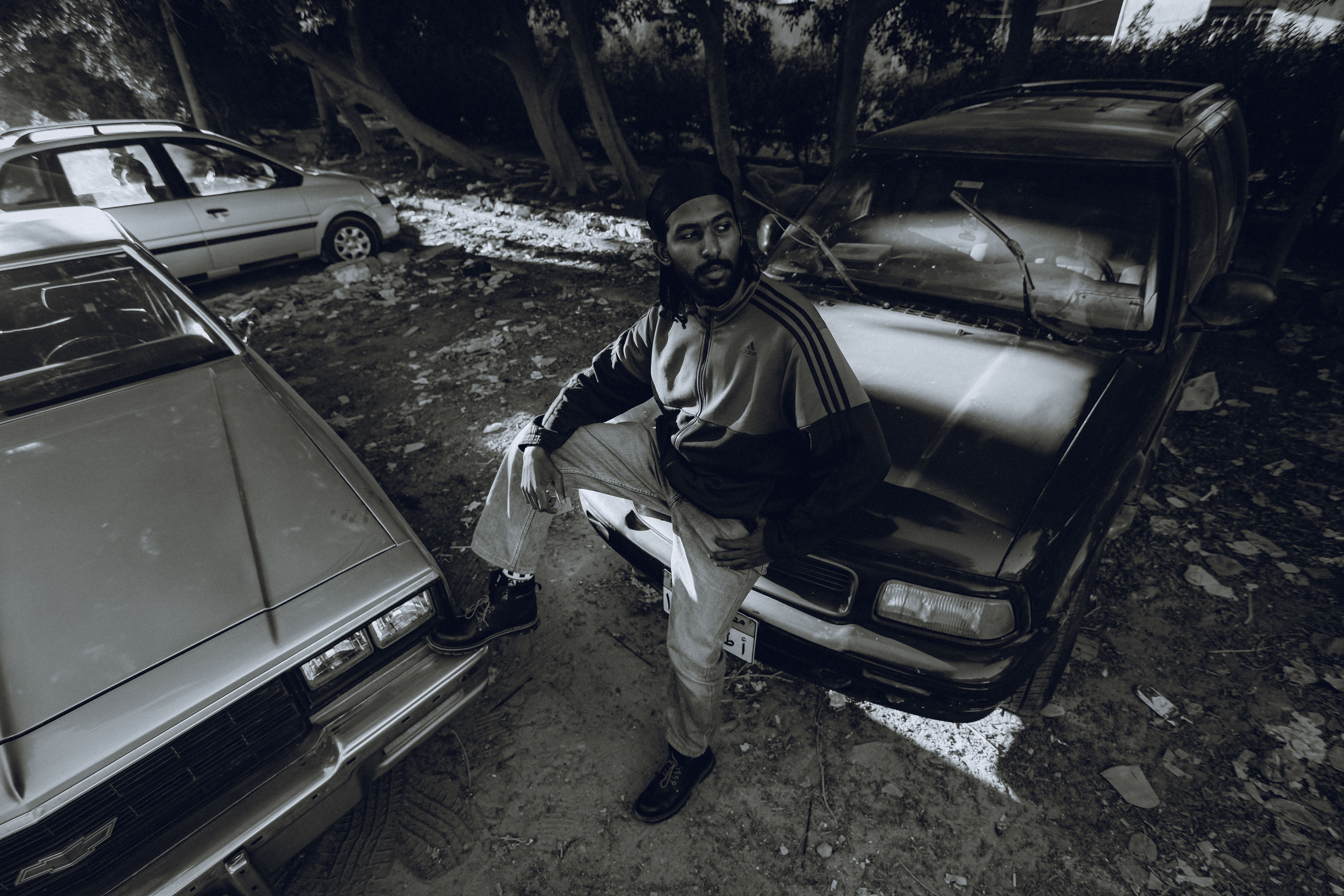 Monochromatic Urban Portrait with Vintage Cars · Free Stock Photo