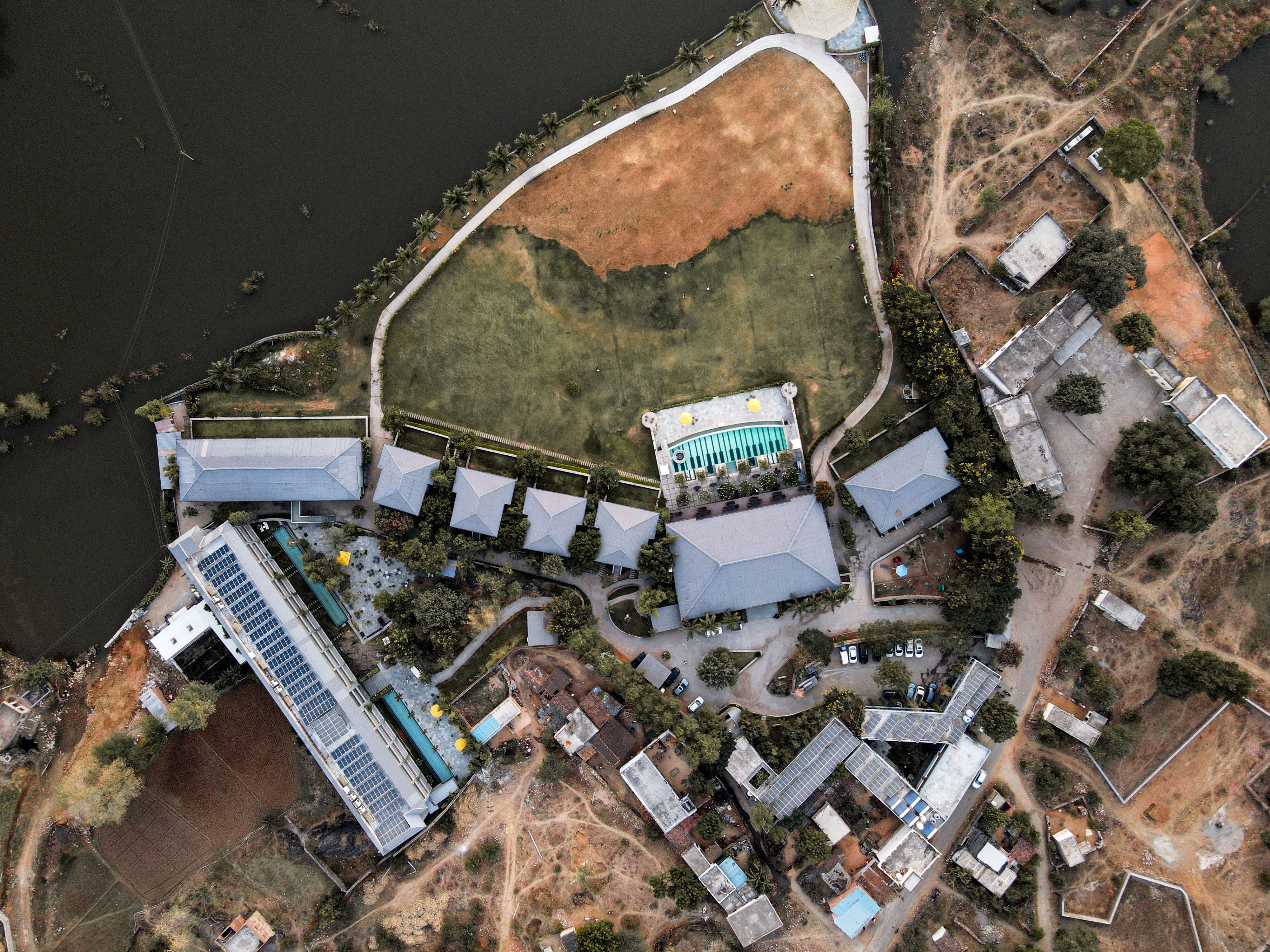 Aerial View of Scenic Resort with Pool in India · Free Stock Photo