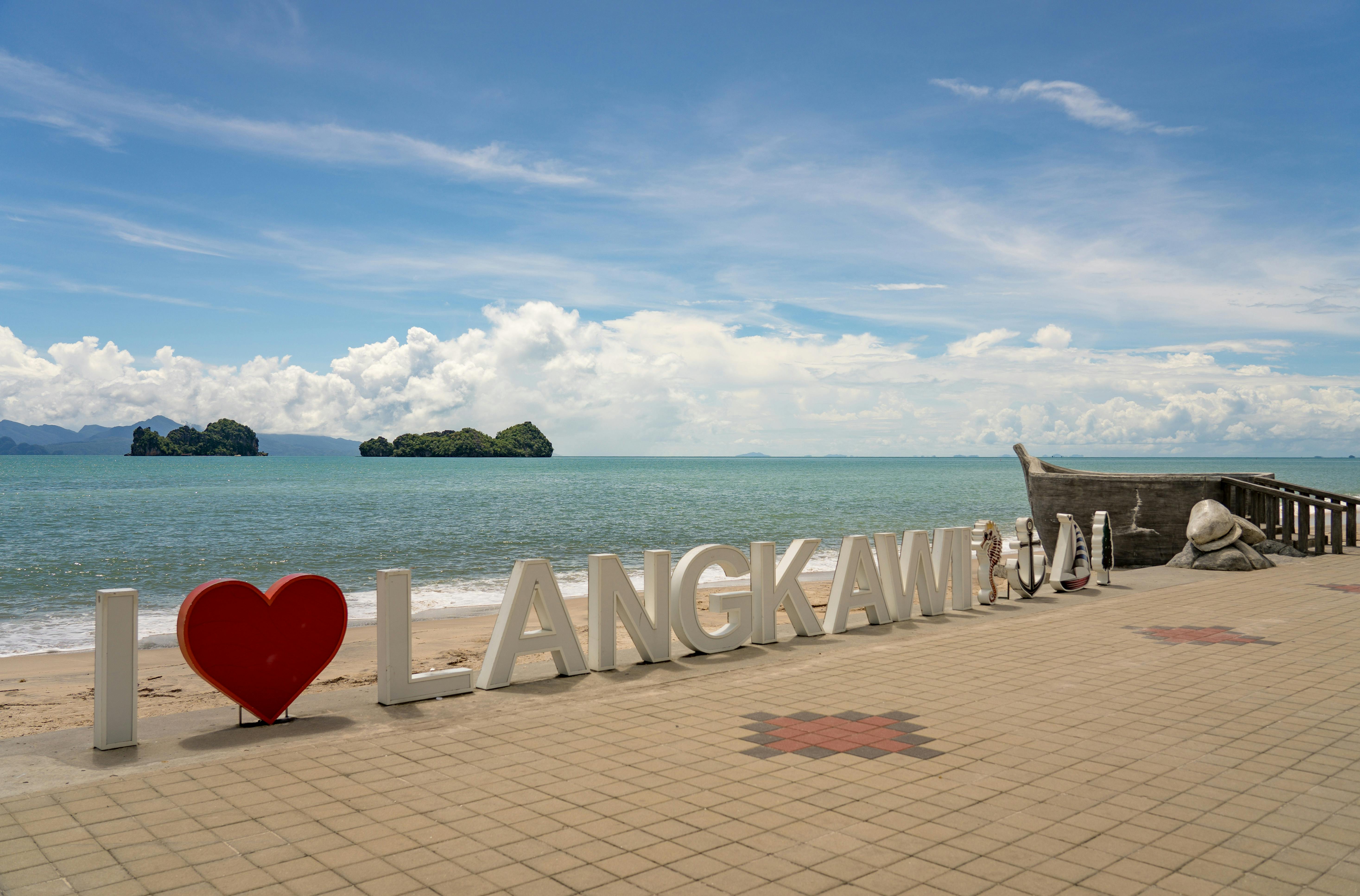 Scenic Langkawi Beachfront with Iconic Sign · Free Stock Photo