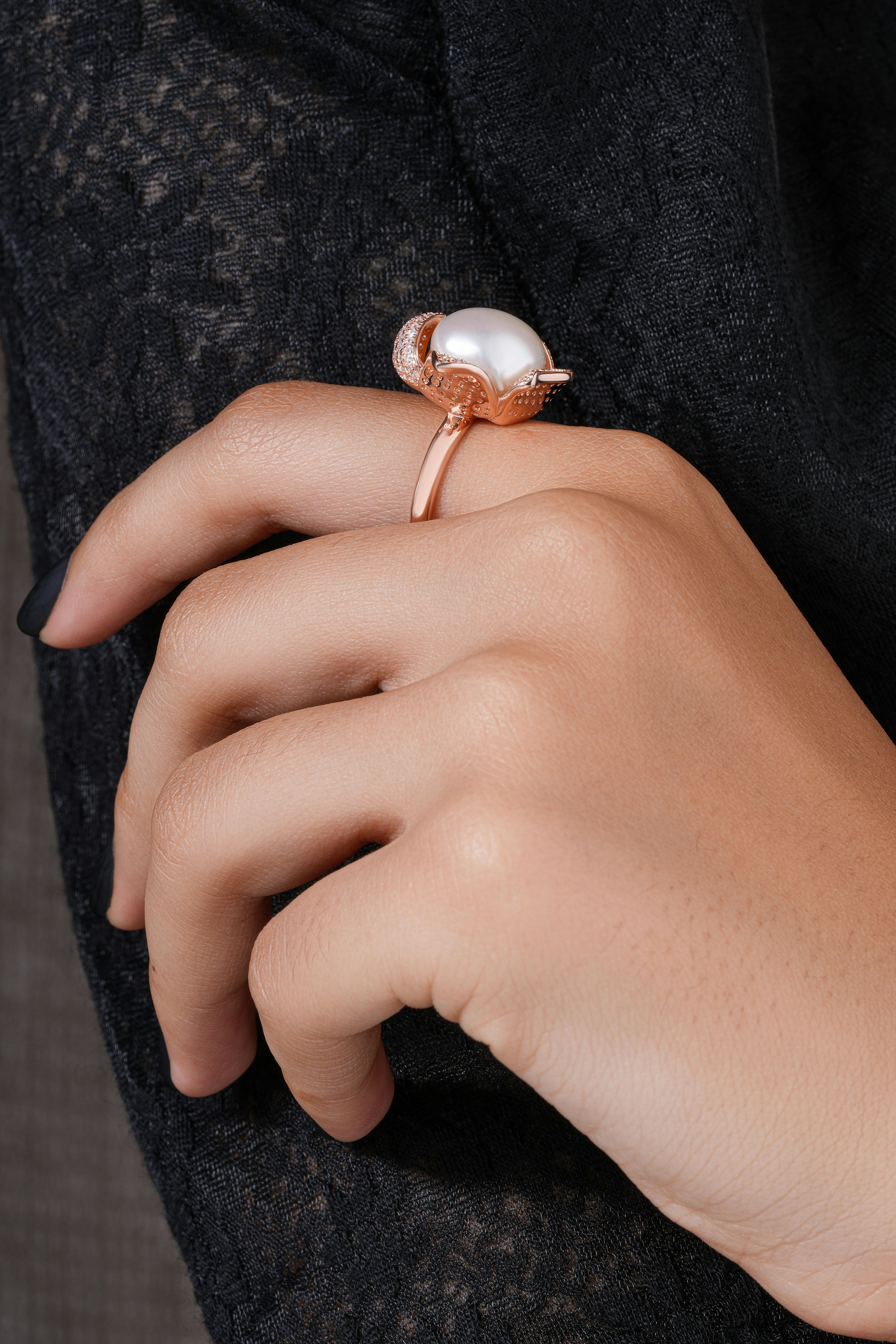 Elegant Pearl Ring on Hand Fashion Photography · Free Stock Photo