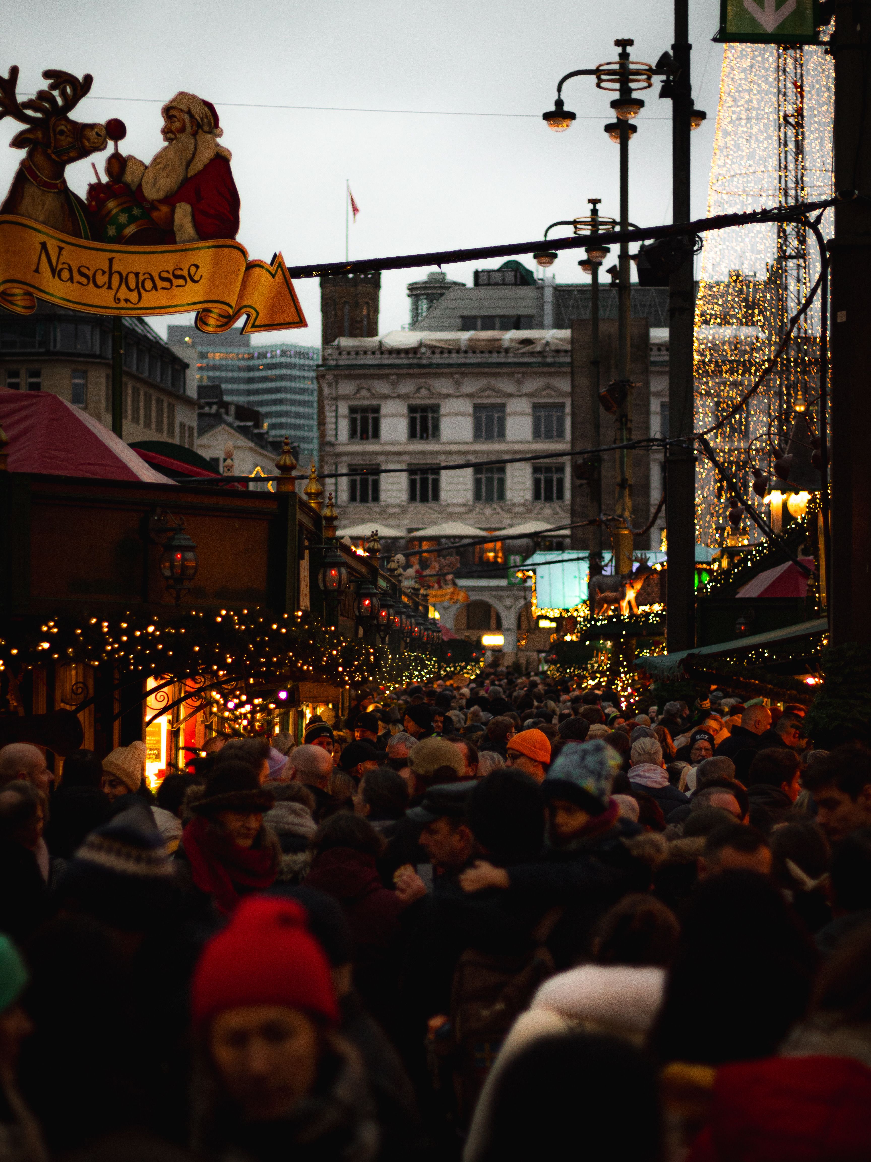 Crowded Christmas Market Scene in Hamburg · Free Stock Photo