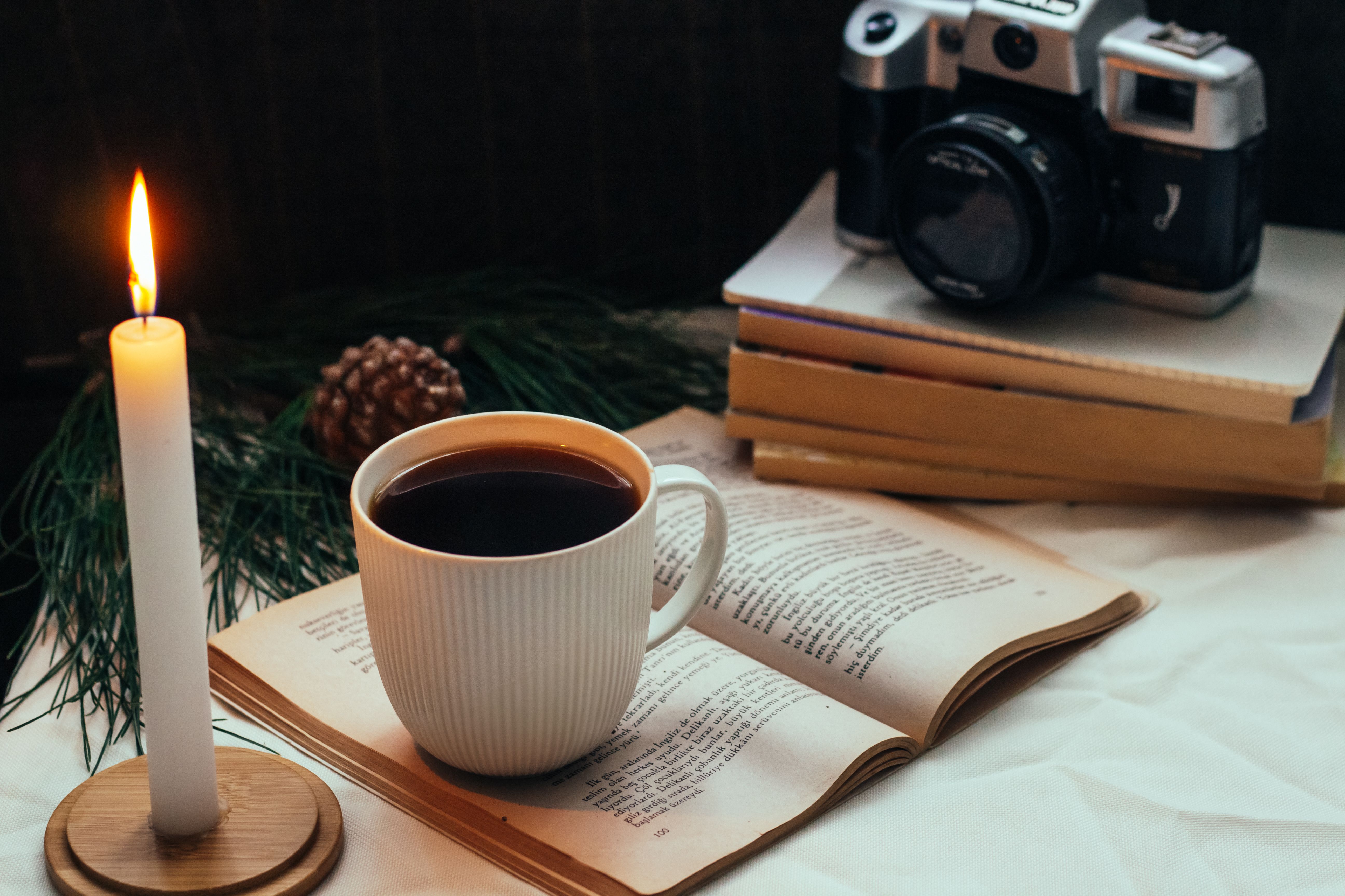 Cozy Coffee and Candlelight Reading Scene · Free Stock Photo