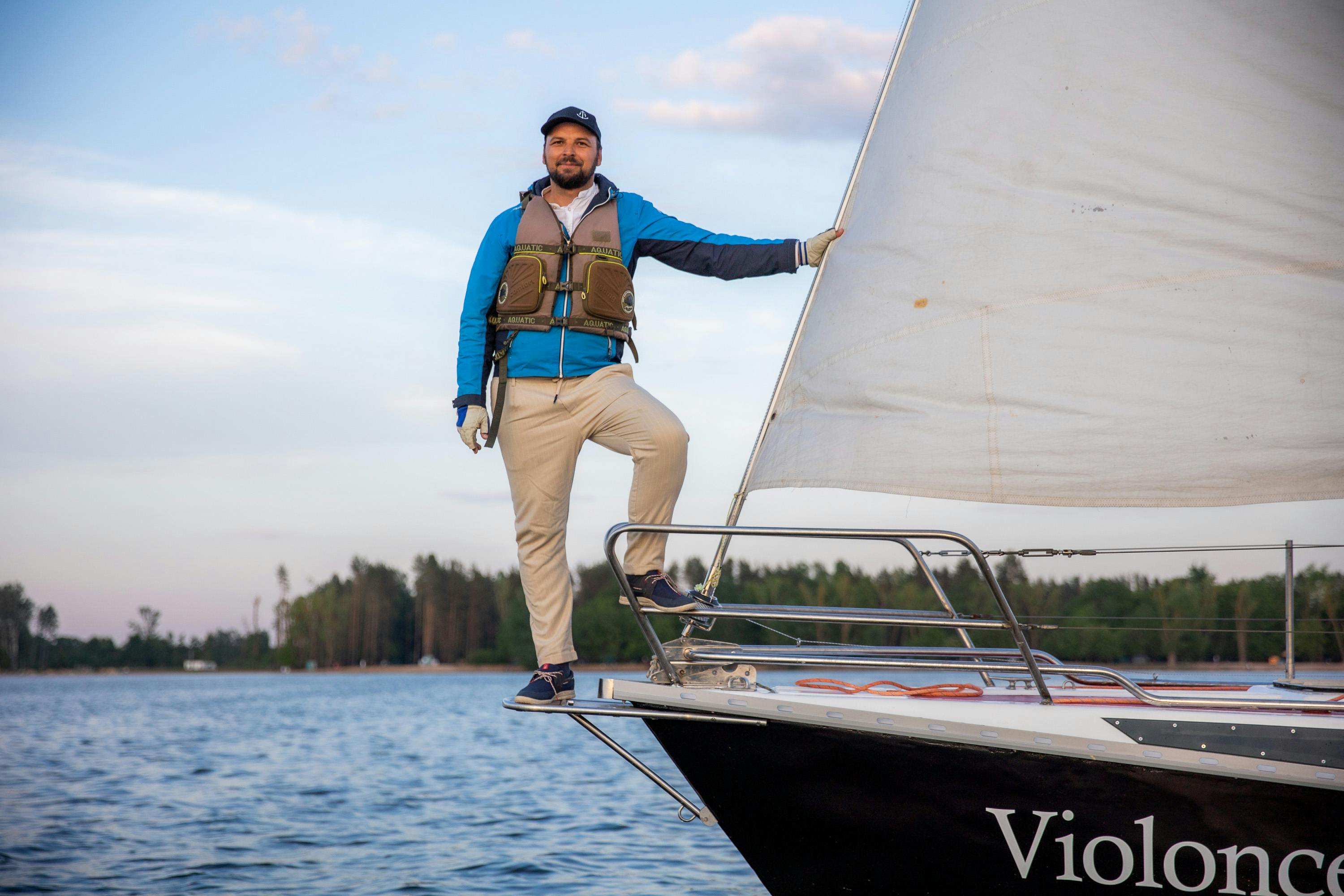 Sailor Navigating Calm Waters at Sunset · Free Stock Photo