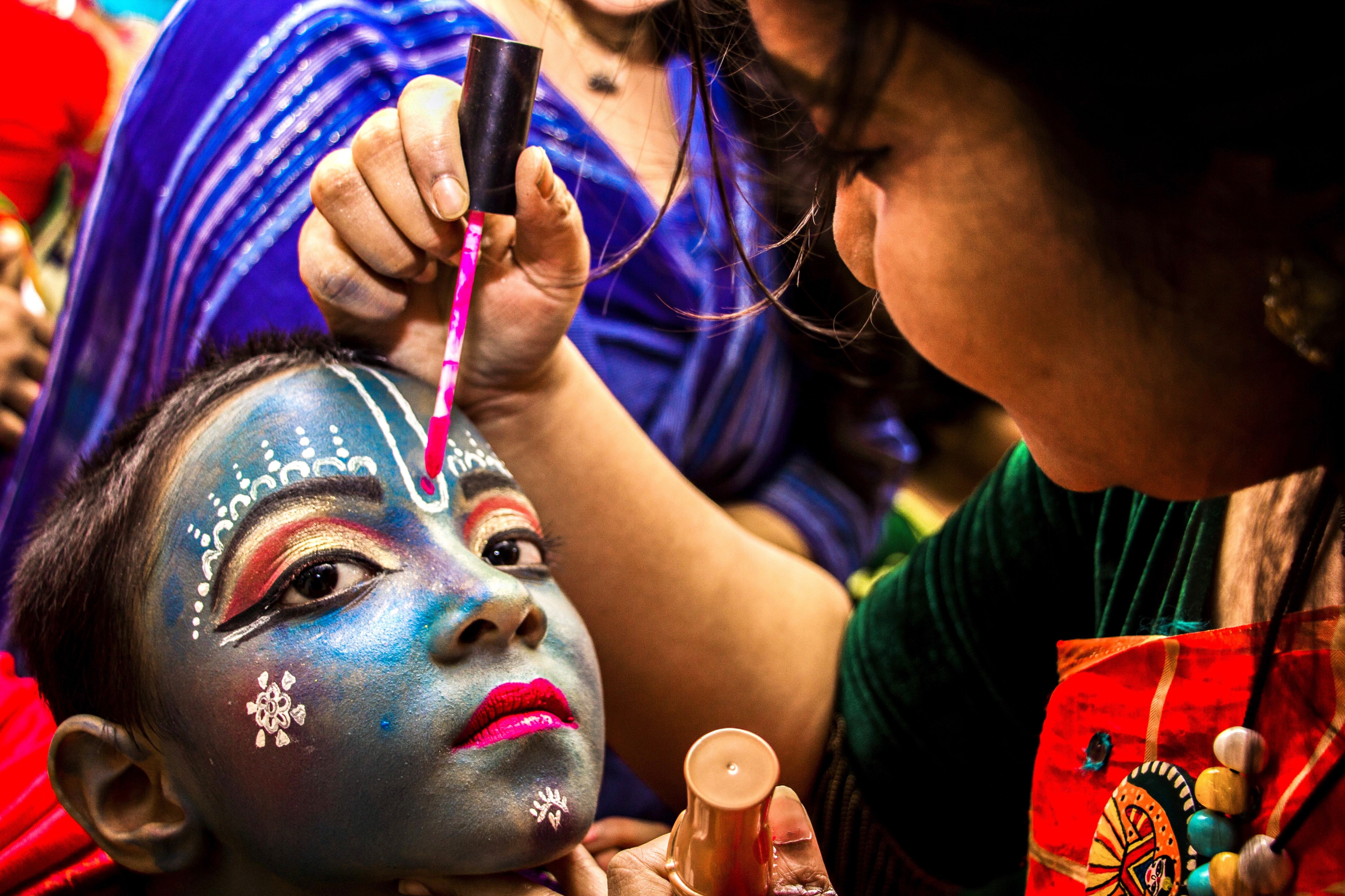 Vibrant Face Painting at Cultural Festival · Free Stock Photo