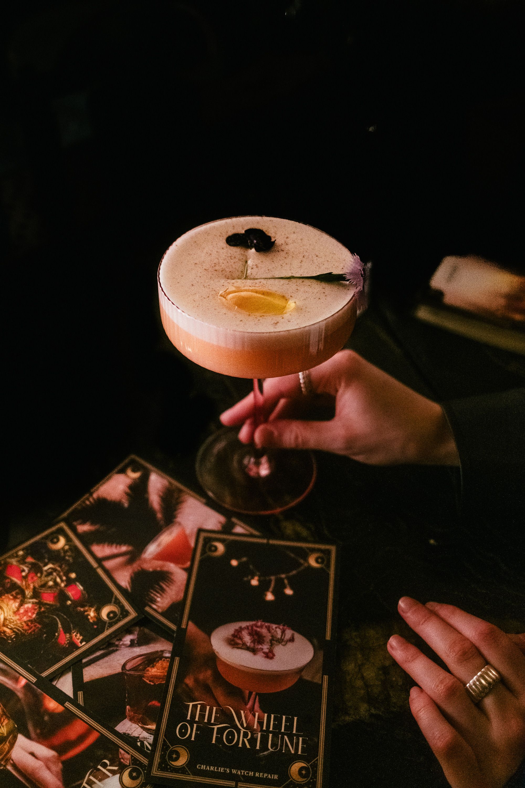 Cocktail with Tarot Cards in a Dimly Lit Setting · Free Stock Photo