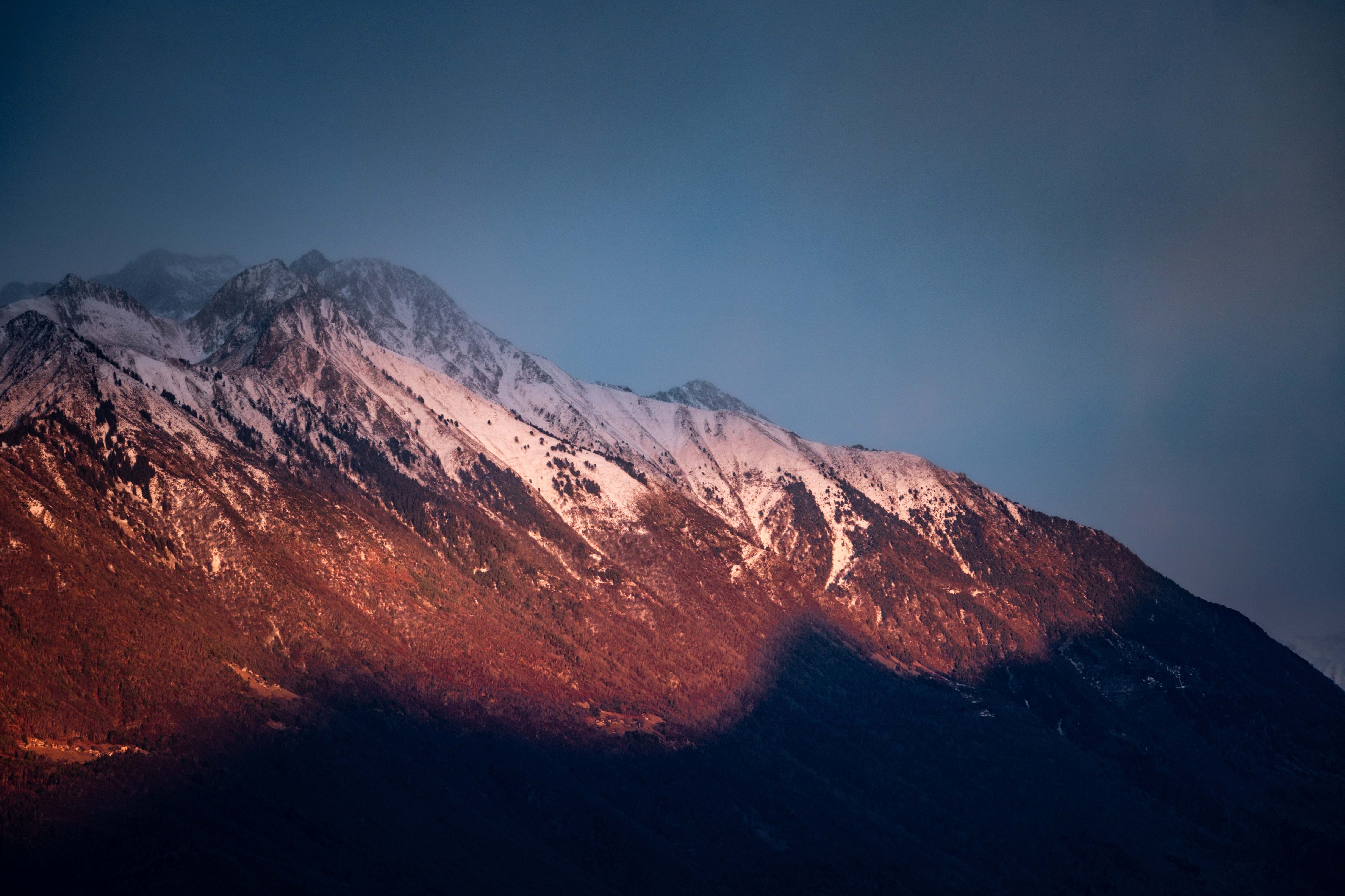 Majestic Snow-Capped Mountain at Sunset · Free Stock Photo